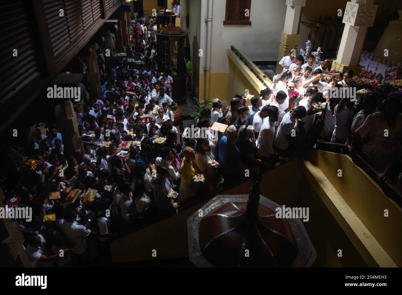 Duruthu Poya Day in Sri Lanka People queue at the Temple of the Tooth ...