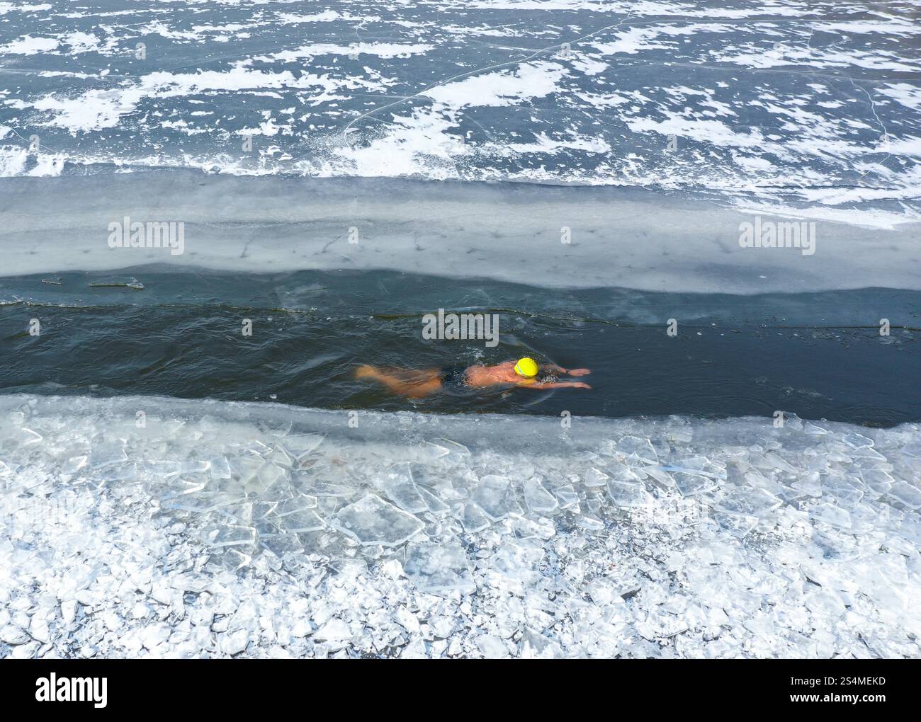 Aerial photo shows people enjoy skating on the frozen Hun River in ...