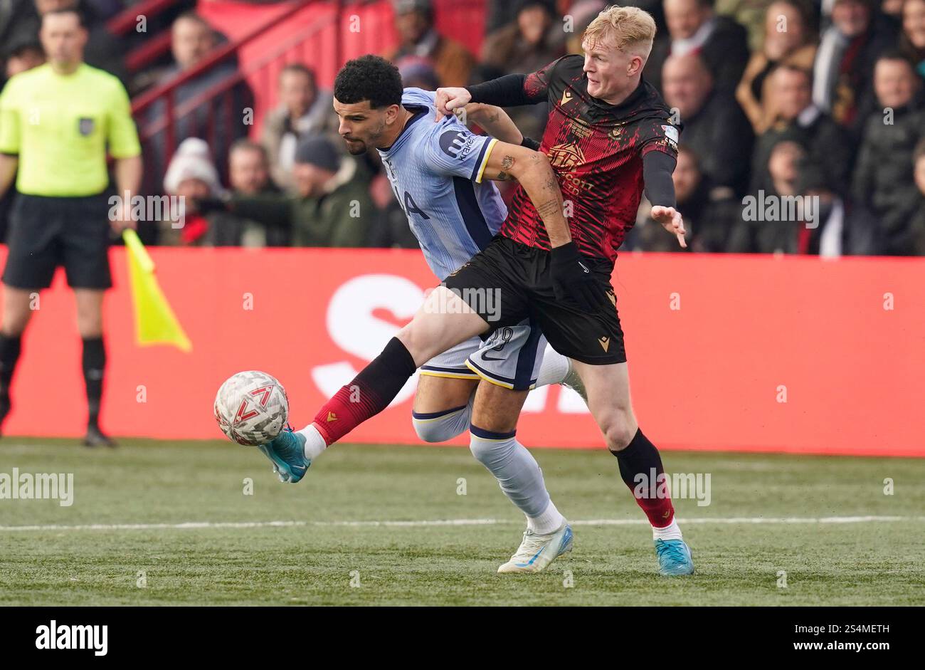 Tamworth, England, 11th January 2025. Dan Creaney of Tamworth (R ...