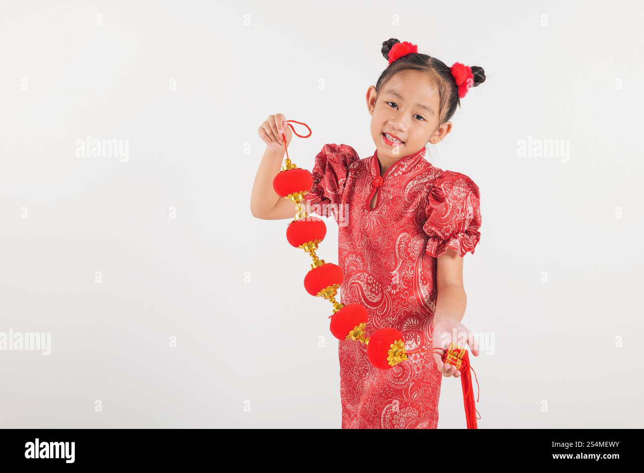 Chinese New Year. Happy Asian Chinese little kid girl smile wearing red ...
