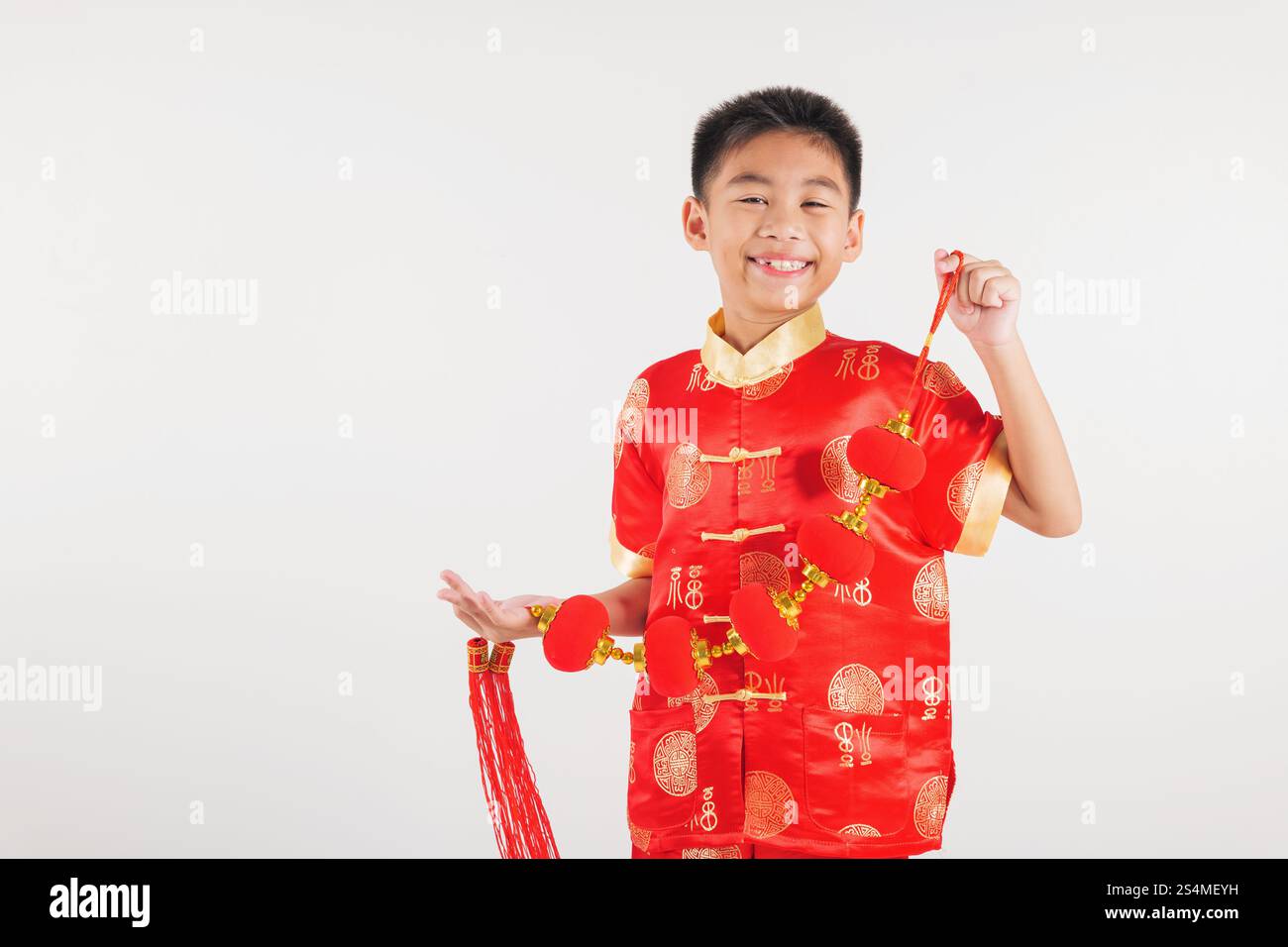 Chinese New Year. Happy Asian Chinese little kid boy smile wearing red ...