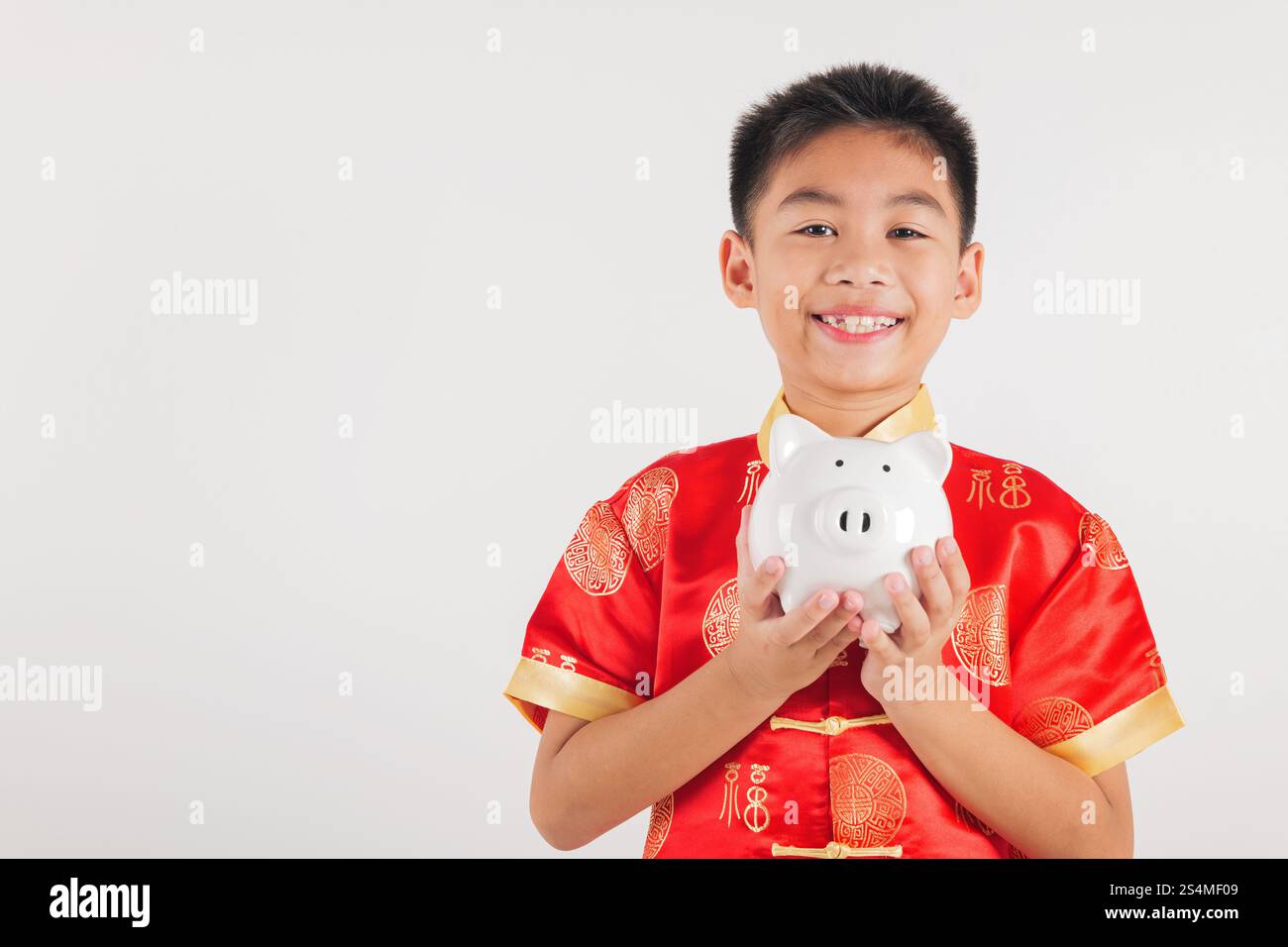 Chinese New Year. Happy Asian Chinese kid Boy smile wear red ...