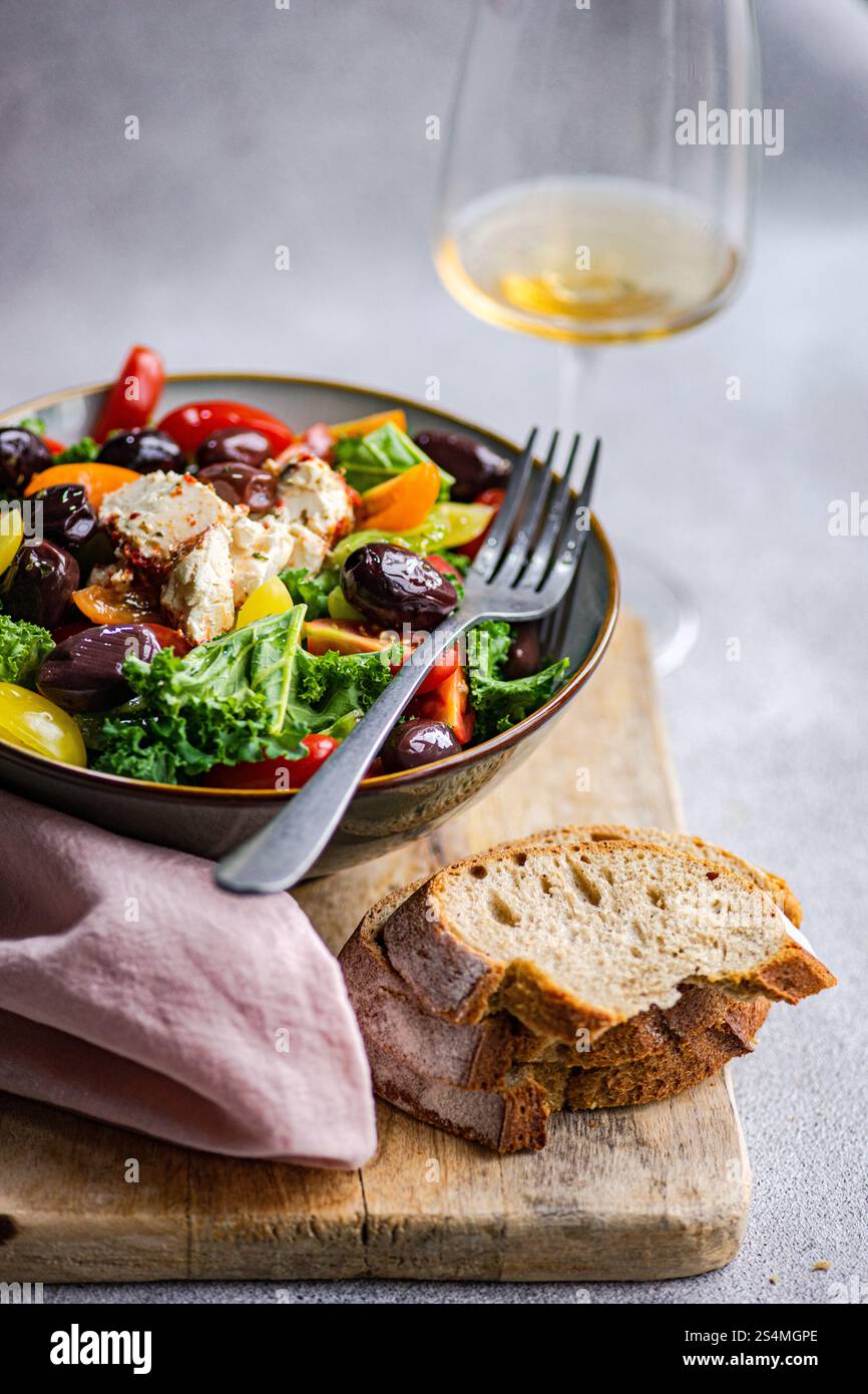 Salad features fresh raw kale, assorted cherry tomatoes, crisp red ...