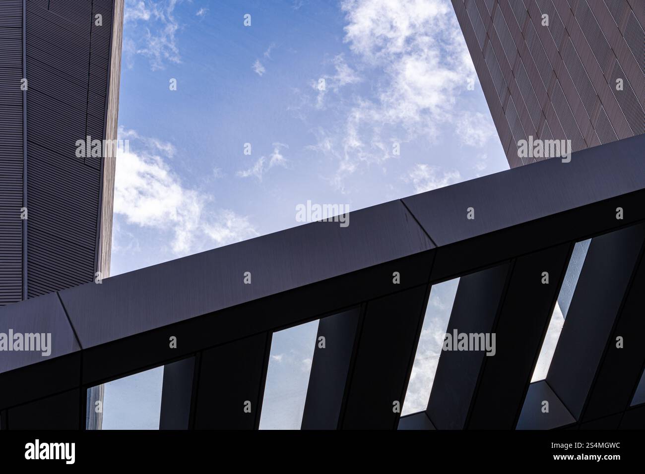 A detailed close-up of modern architecture featuring sharp lines and ...