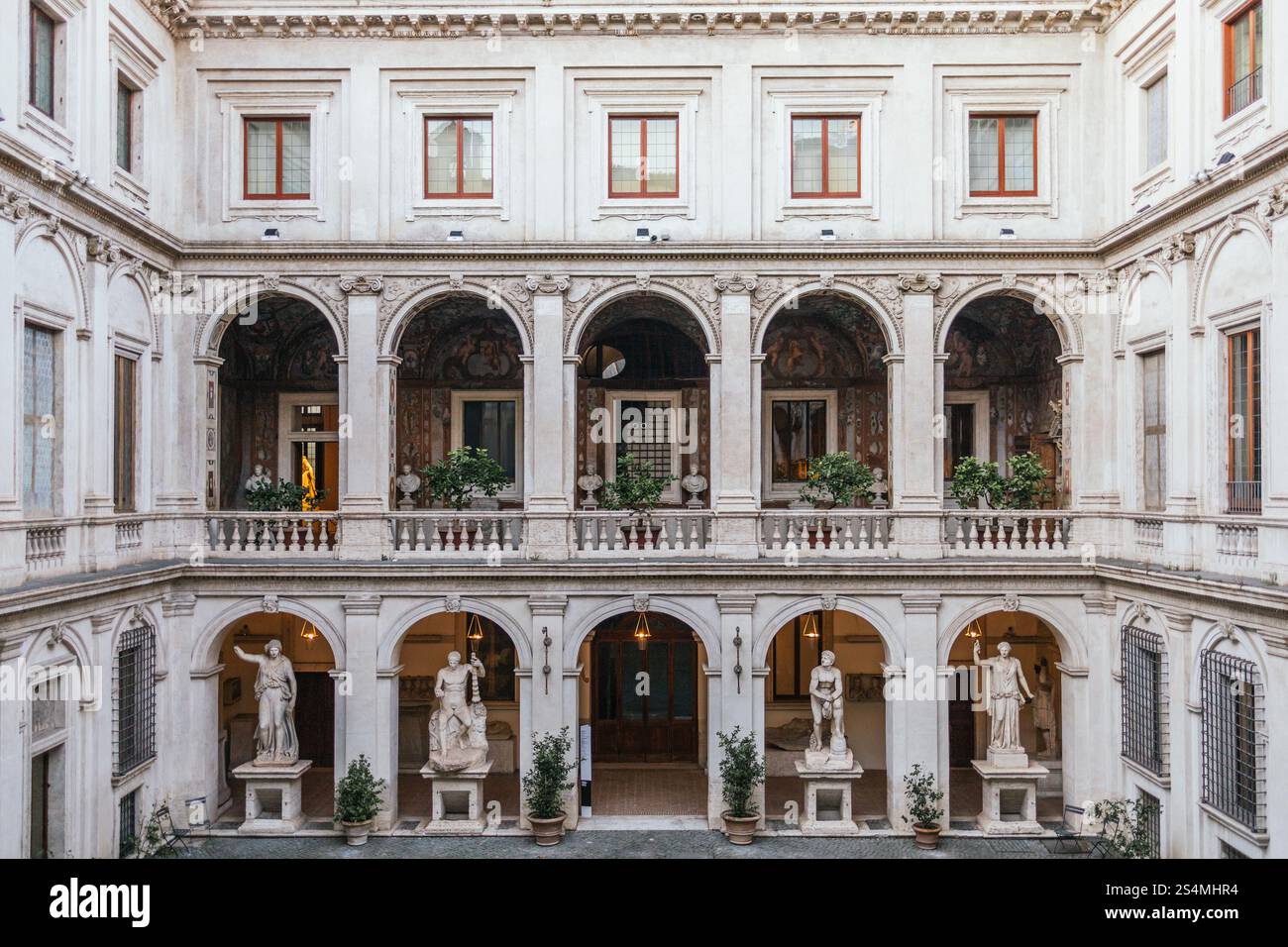 A stunning Roman courtyard featuring elegant arches and classical ...