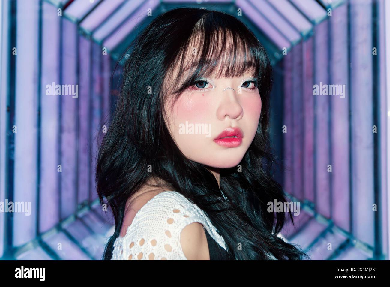 An Asian Gen Z girl with creative makeup explores a bright and vibrant ...