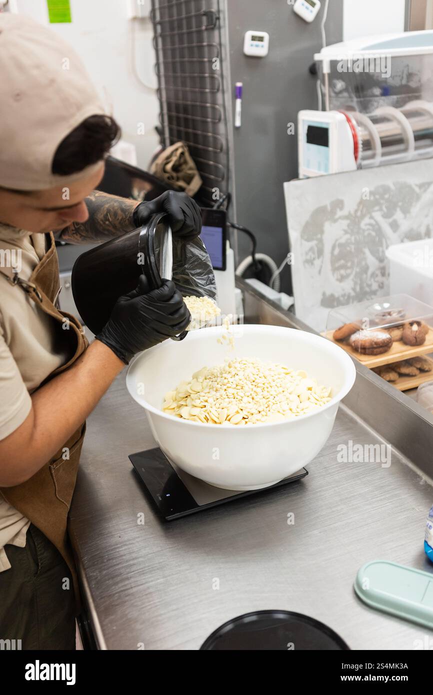 Chef pours chocolate dough baking hi-res stock photography and images ...