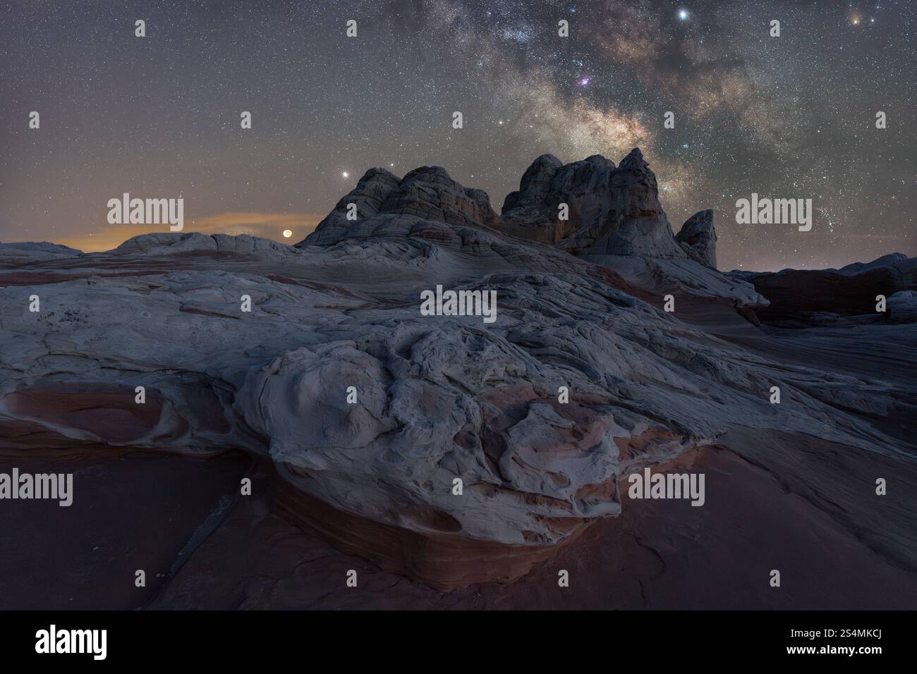 A breathtaking view of Utah's desert landscape under a star-studded Milky Way. No people in this ...