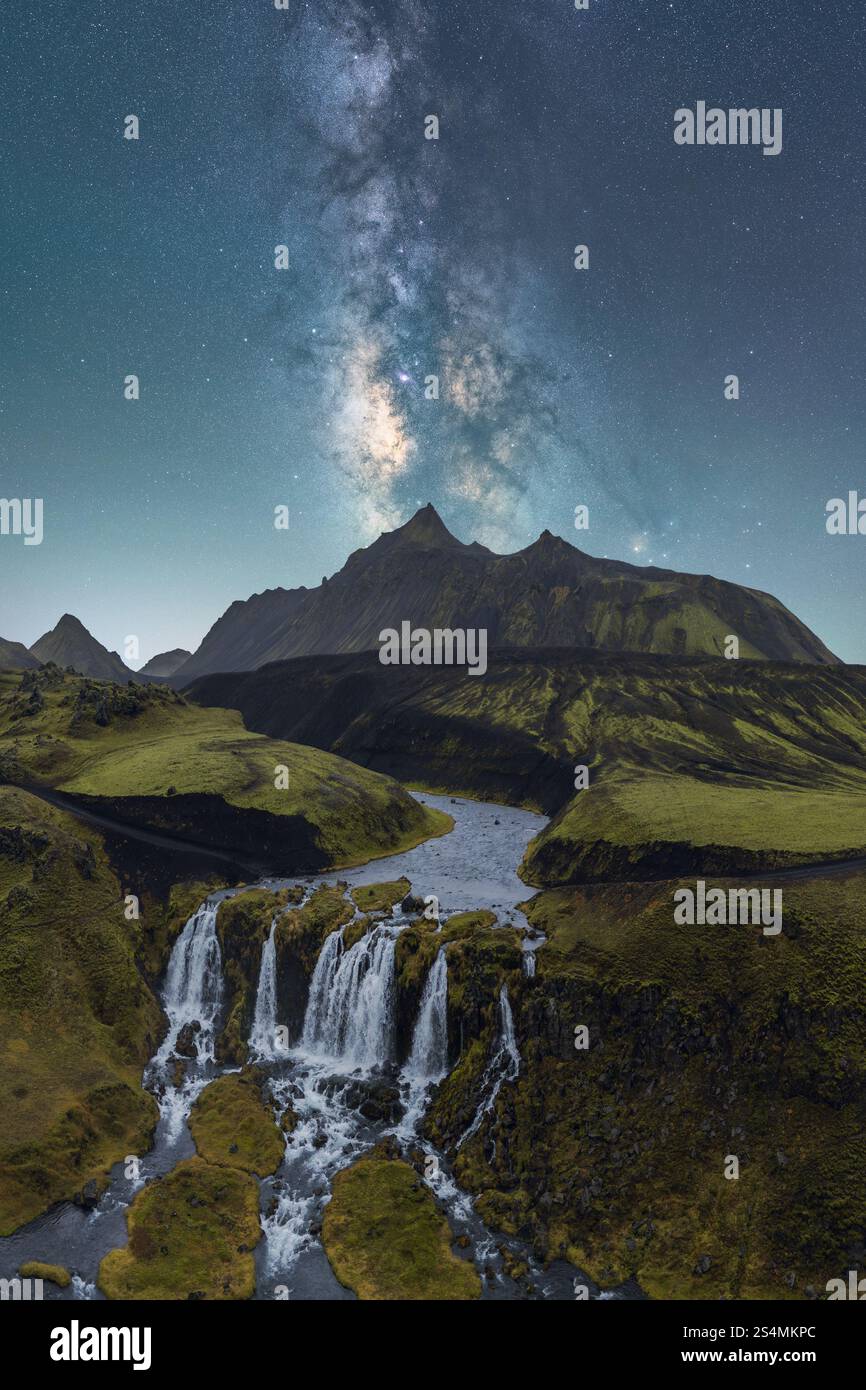 A breathtaking view of the Milky Way illuminating the night sky over a ...