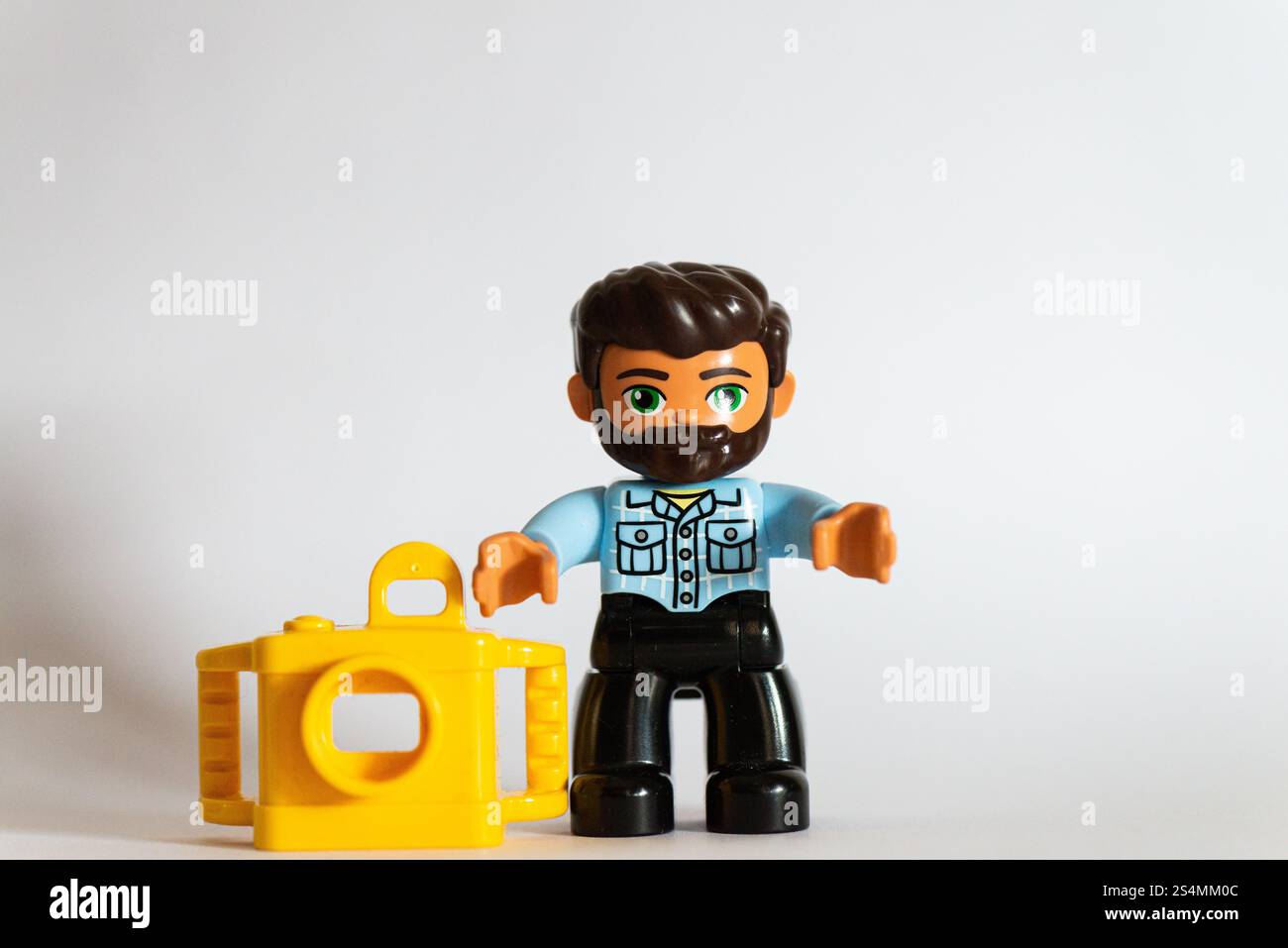 A Duplo man with a camera Stock Photo - Alamy