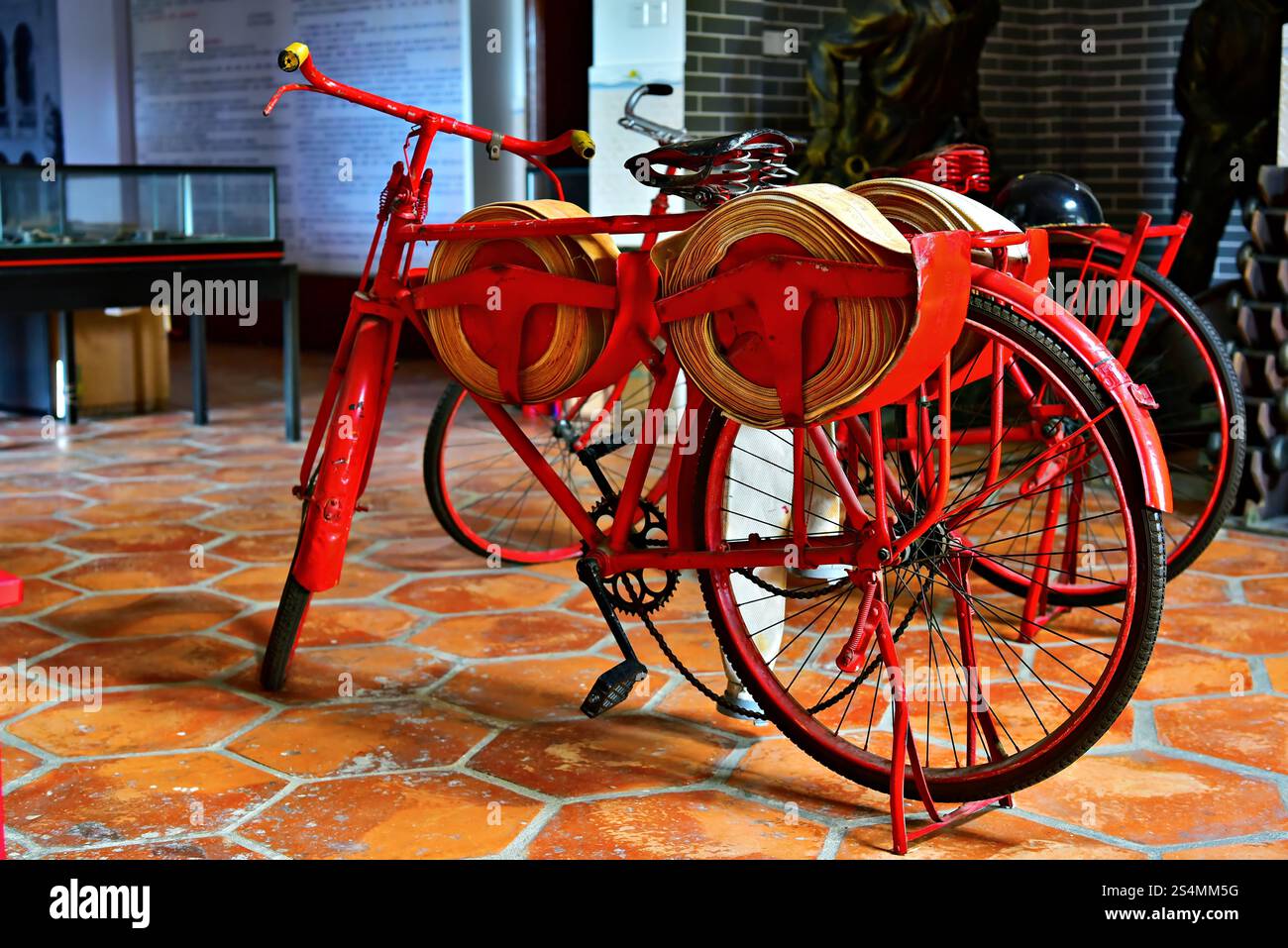 Historical fire brigade bicycle on display at the Fire Brigade Museum ...