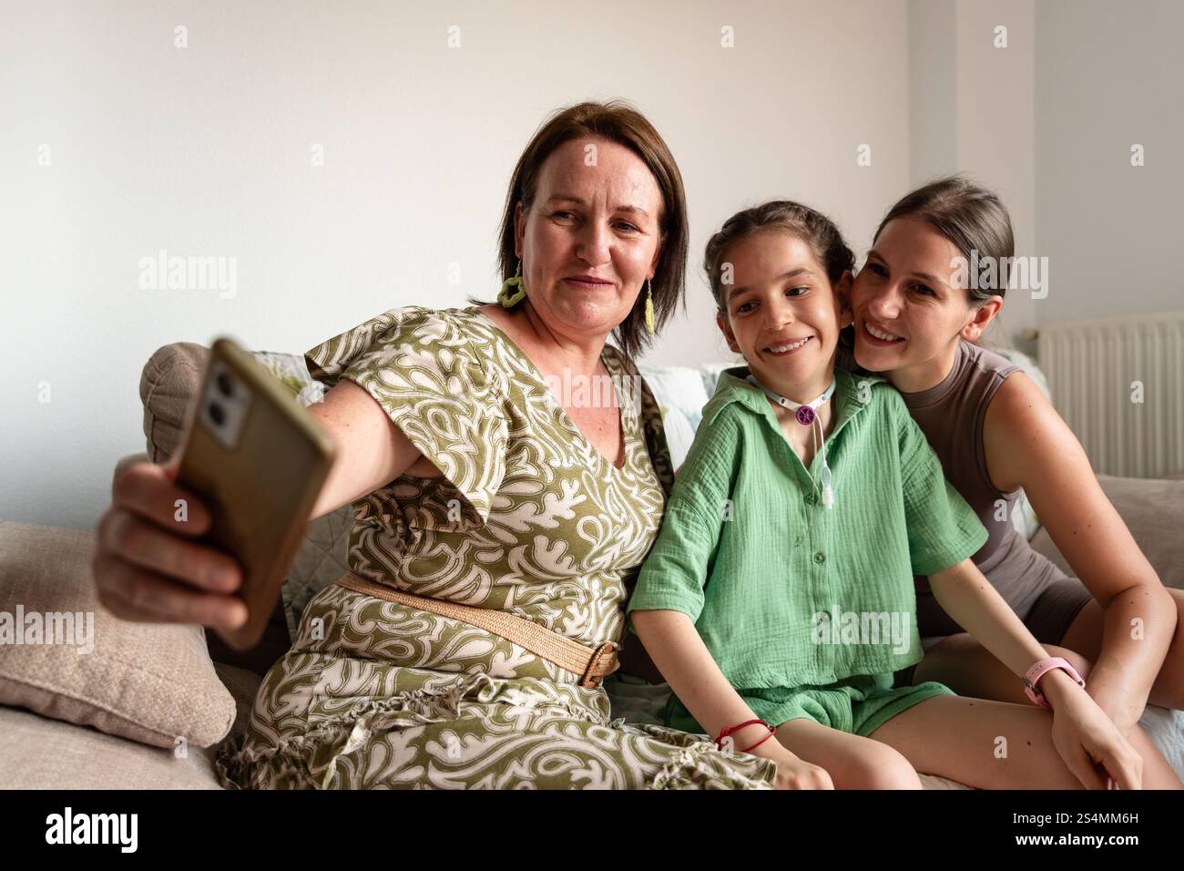A family enjoying quality time together. A young girl with a ...