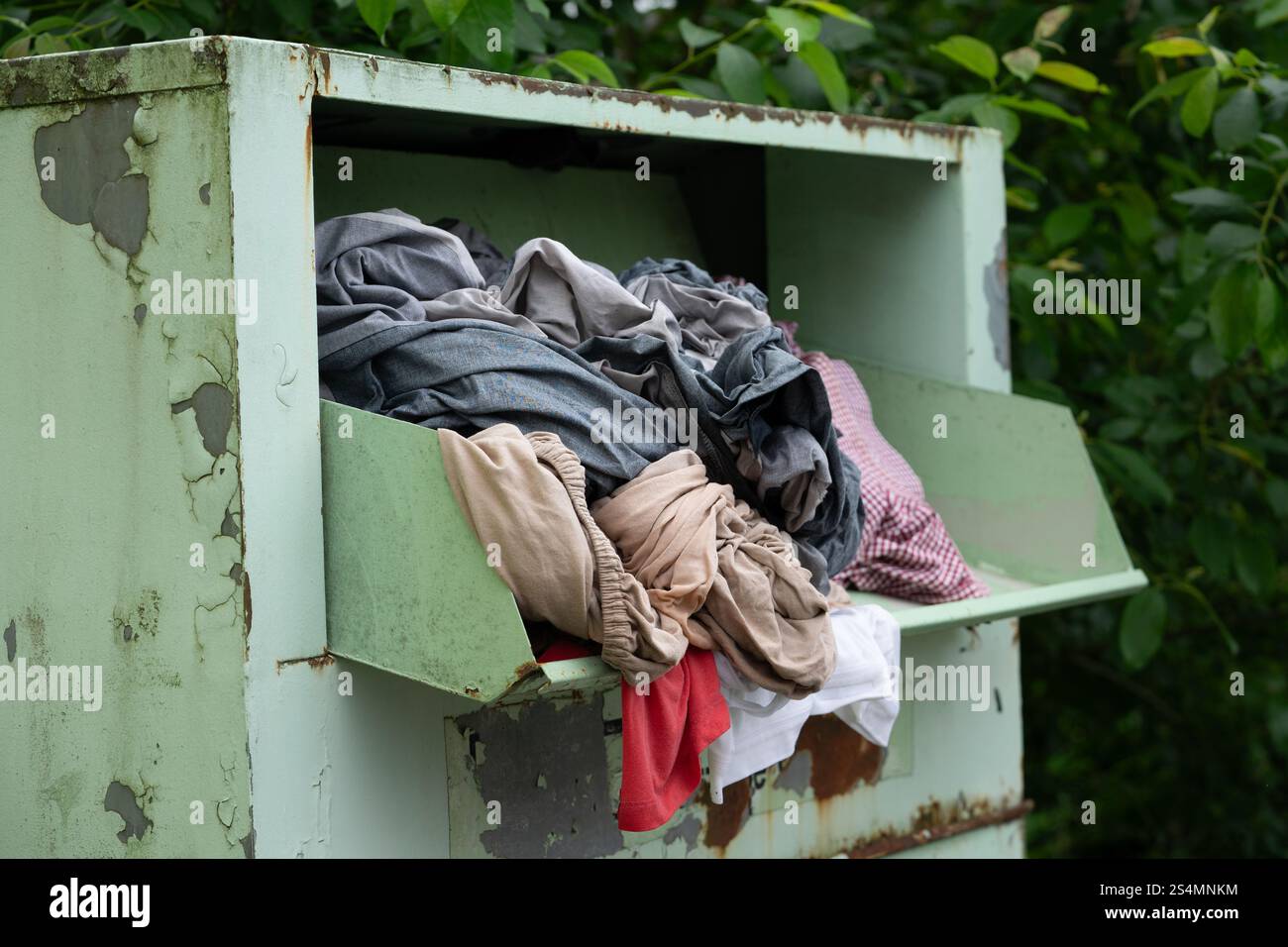 Old clothes collection container hi-res stock photography and images ...