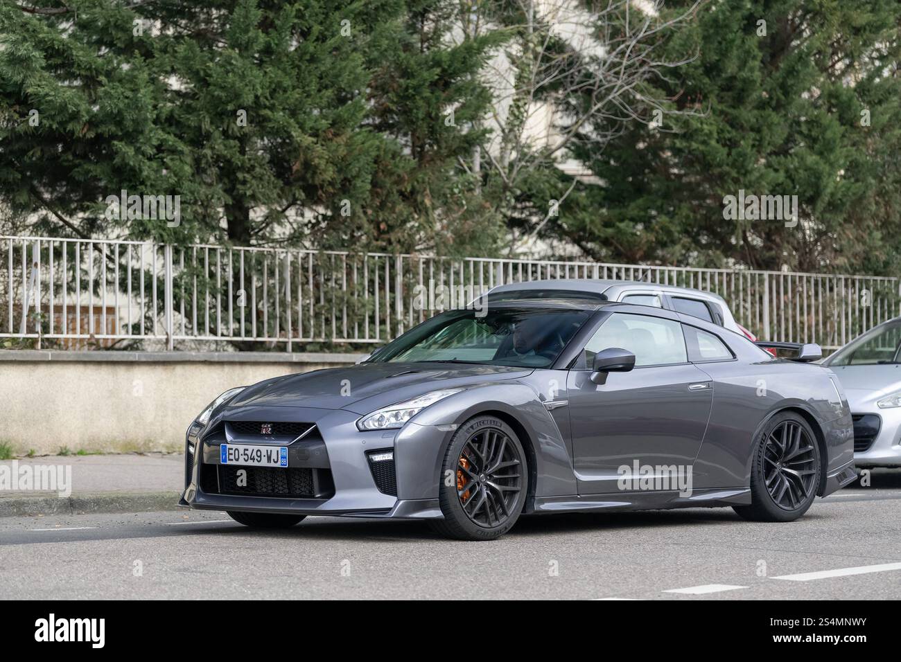 Nancy, France - View on a grey Nissan GT-R driving on a street Stock ...