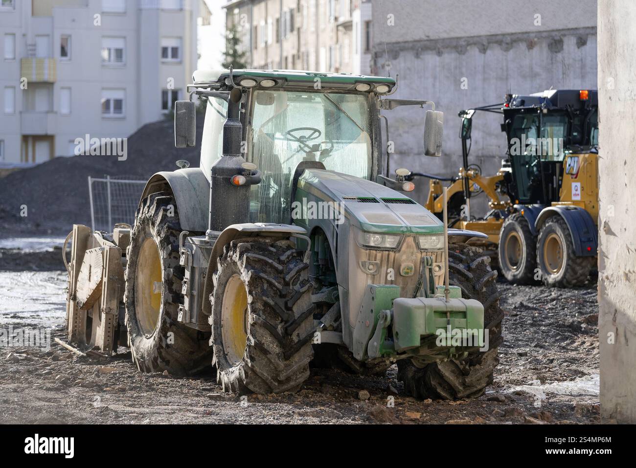 Nancy, France - Green tractor John Deere 8345R with a lime mixer for ...