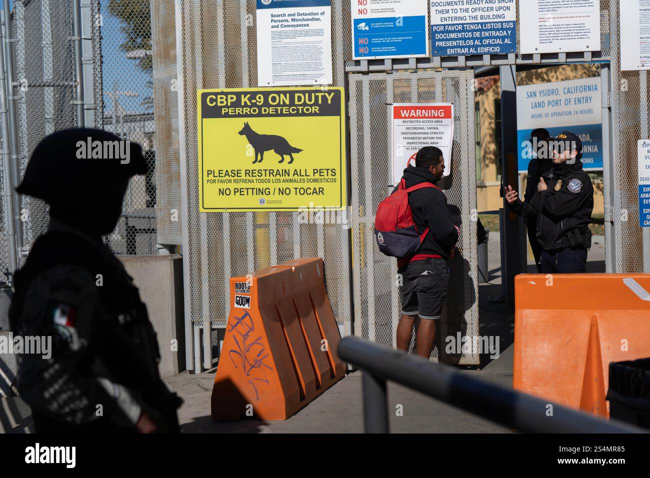 Tijuana, Mexico. 17th May, 2021. An immigrant man speaks with a U.S ...