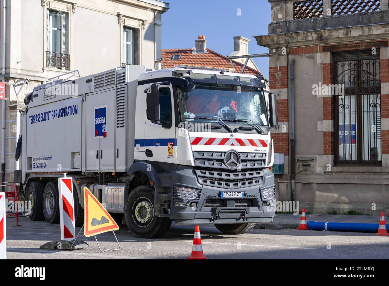 Nancy, France - View on a yellow suction excavator truck Mercedes-Benz ...