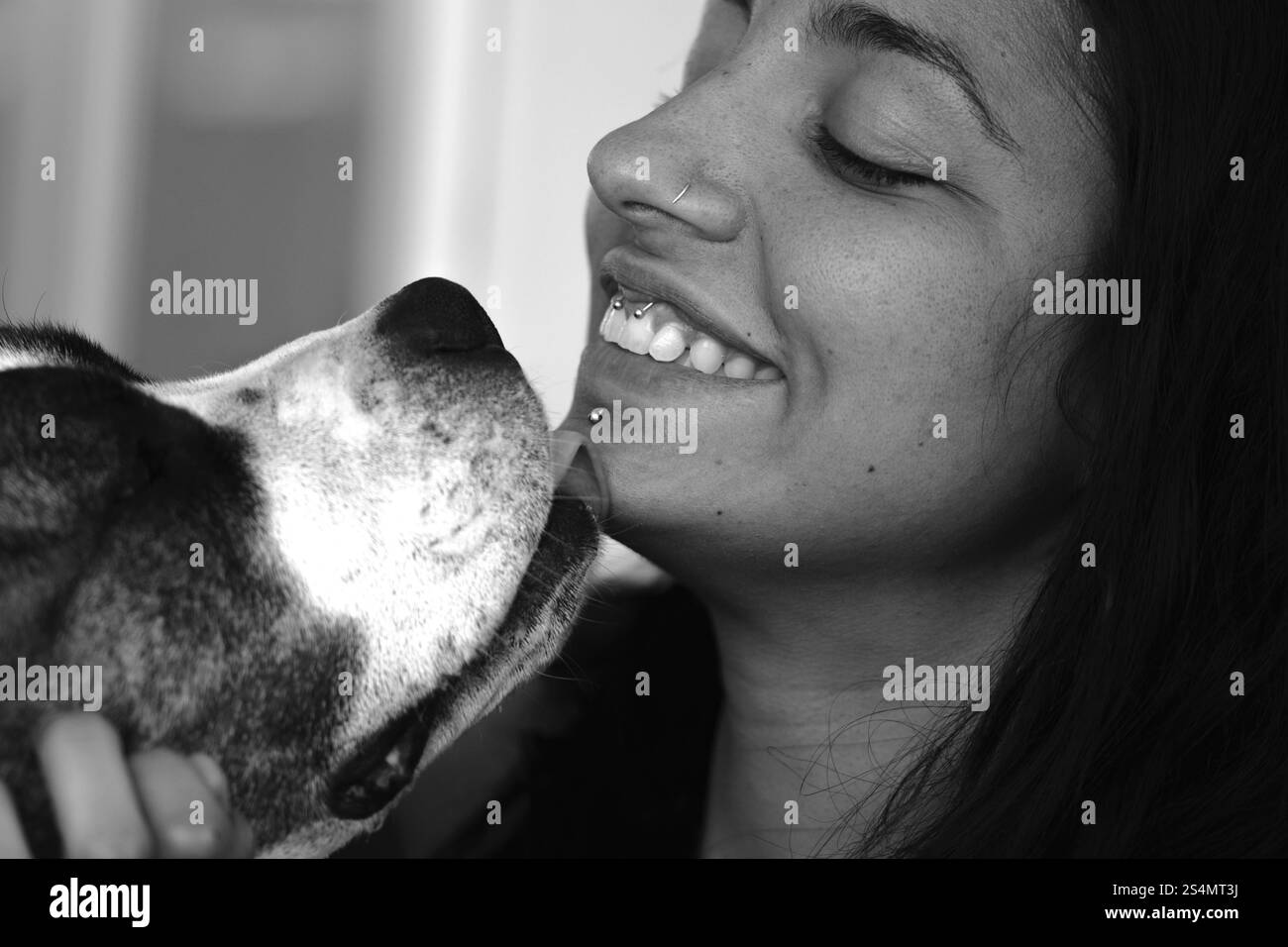 Licking his mouth Black and White Stock Photos & Images - Alamy