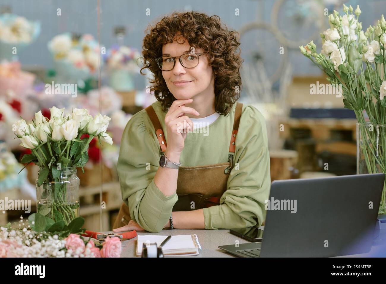 Beautiful florist look camera flower hi-res stock photography and ...