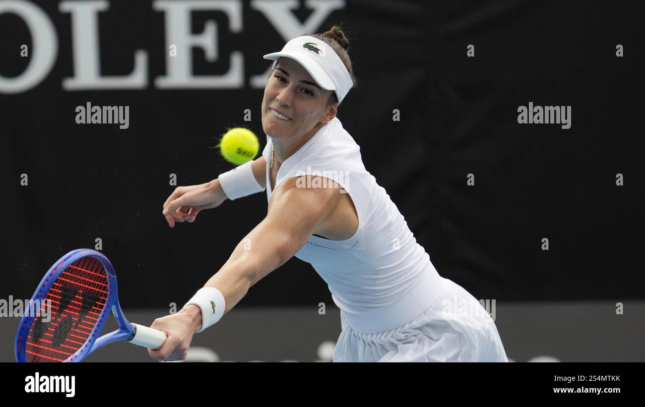Bernarda Pera of the U.S. plays a backhand return to Tatjana Maria of ...
