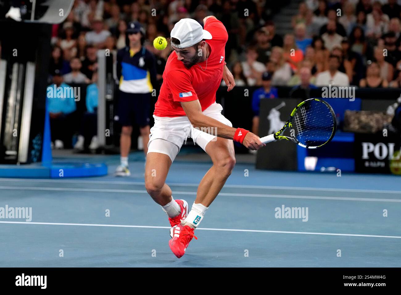 Jacob Fearnley of Britain plays a backhand return to Nick Kyrgios of ...