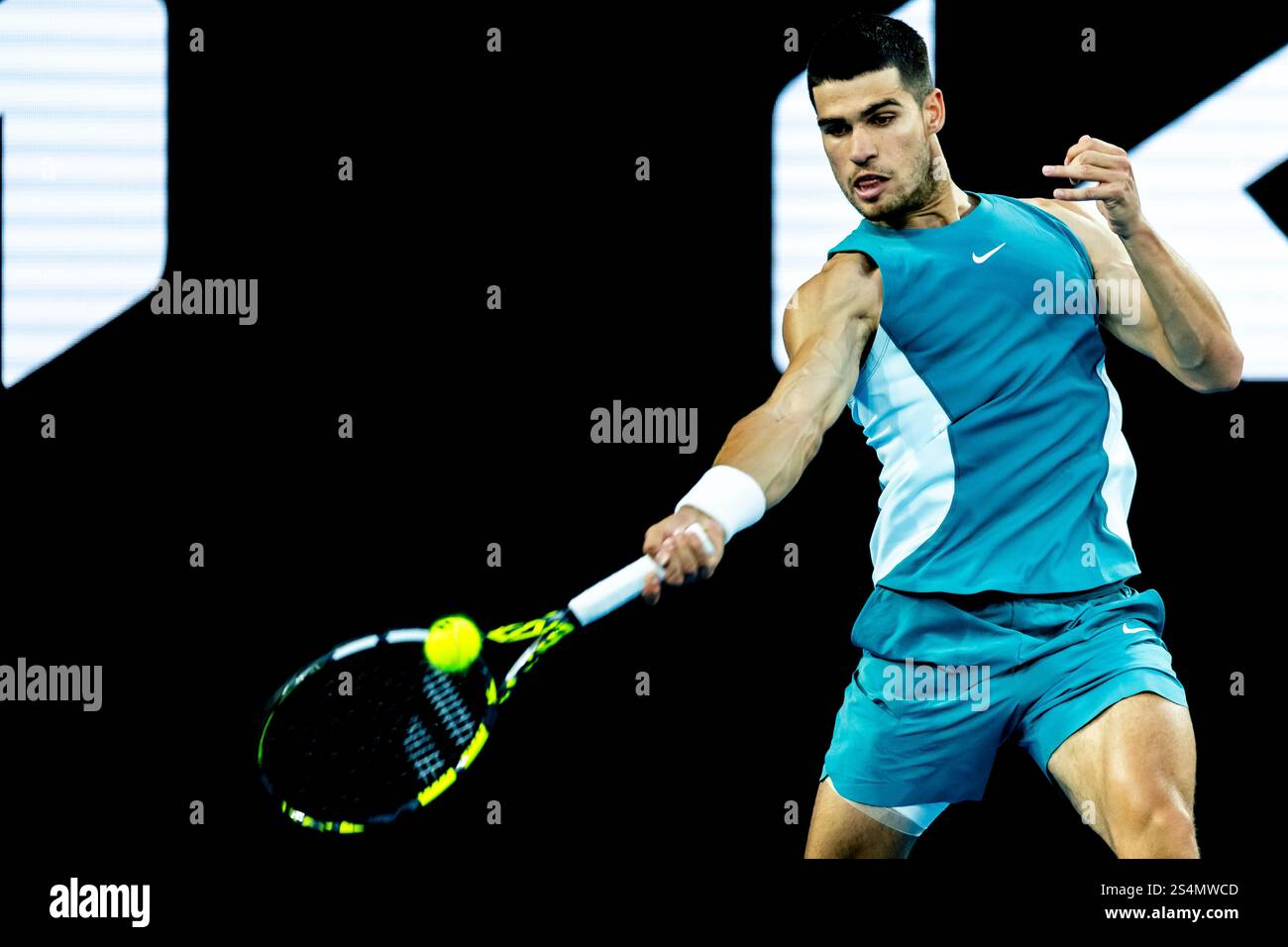 MELBOURNE, VIC - JANUARY 13: Carlos Alcaraz of Spain in action during ...