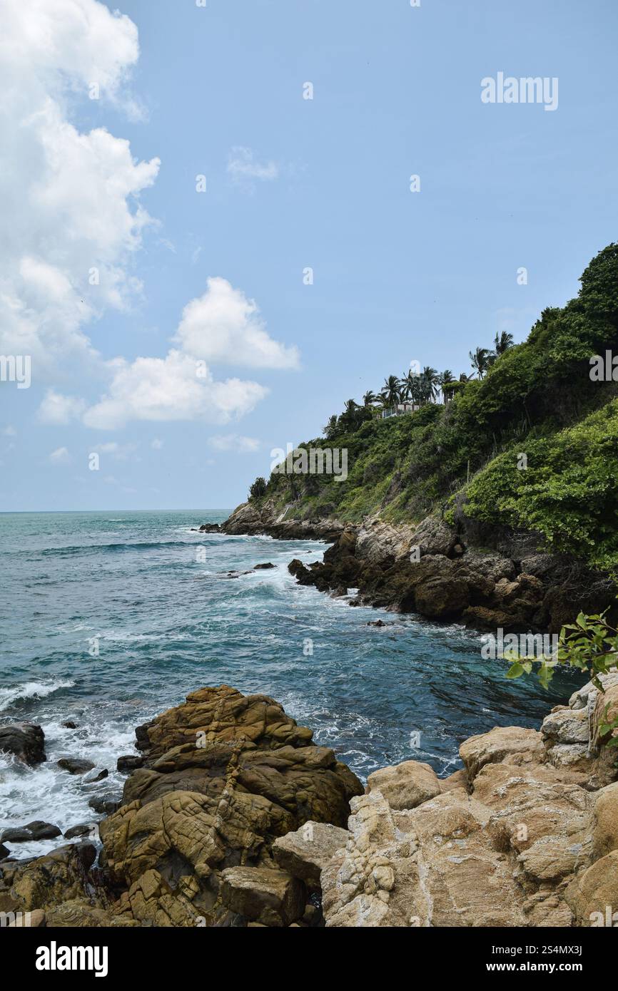 Idyllic blue beach in a beautiful tropical landscape of Oaxaca, Mexico ...