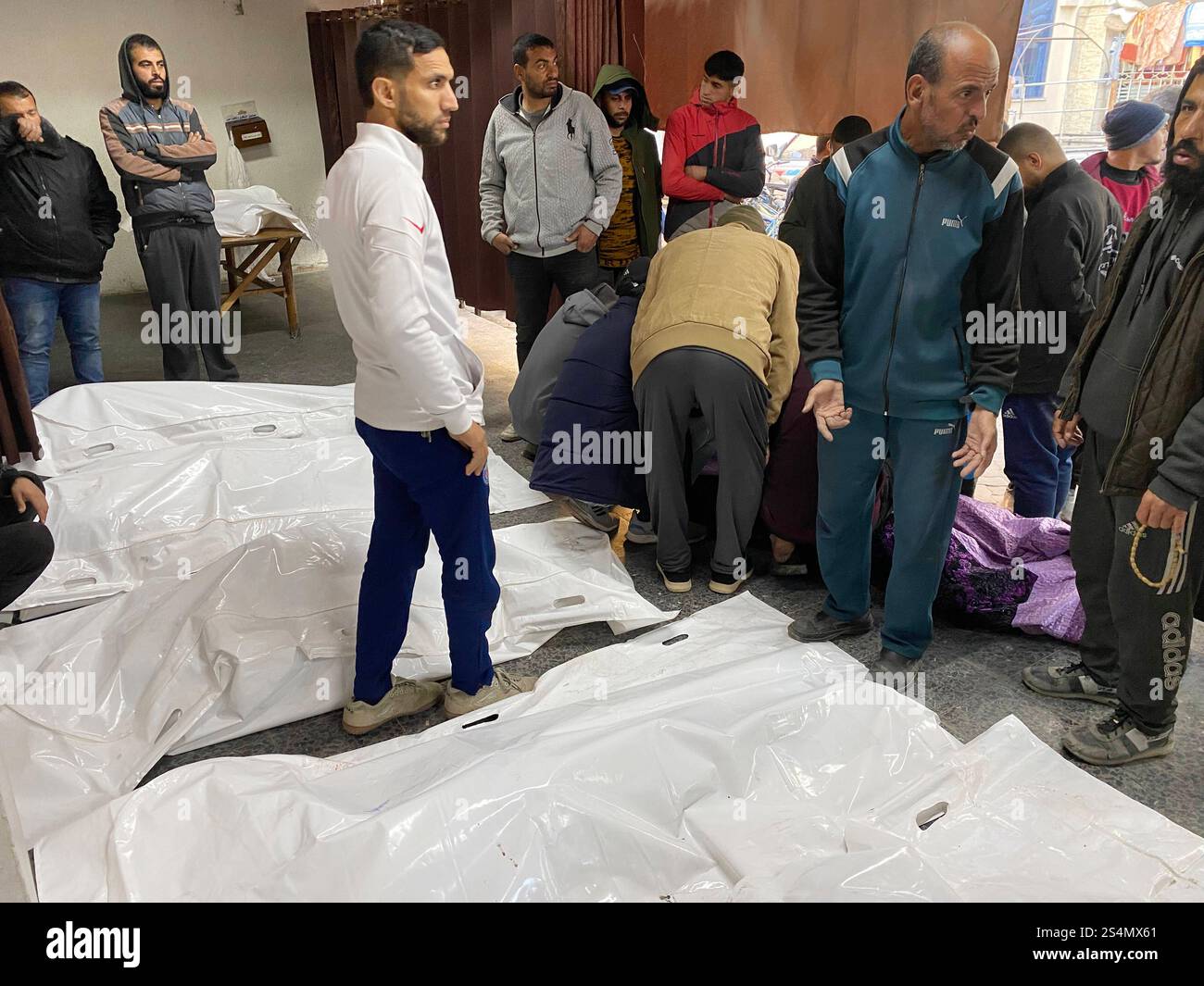Relatives of the Palestinians killed in Israeli attack on Salah al-Din ...