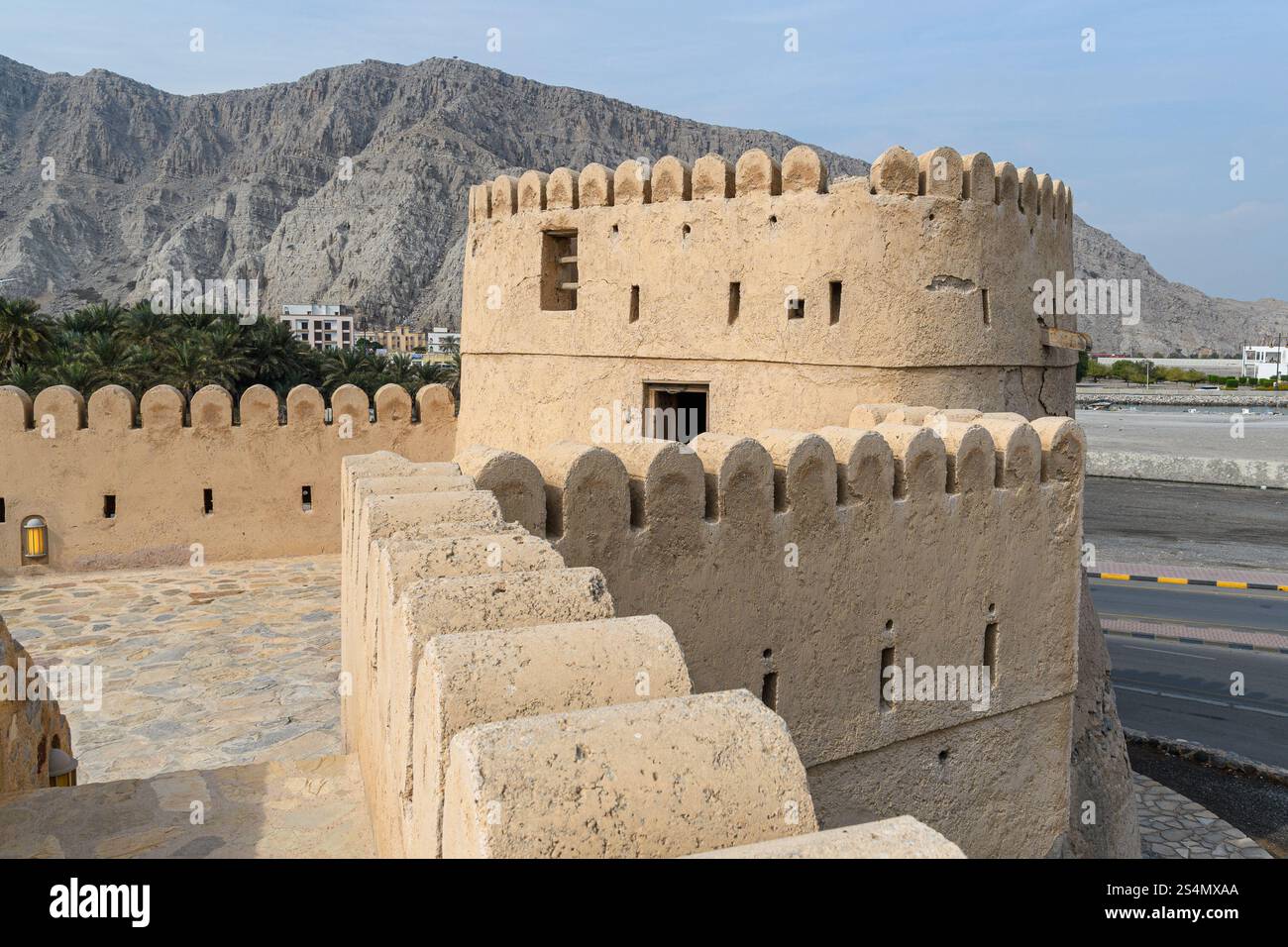 Khasab, Oman - January 1, 2025: A view of one of the towers of Khasab Castle, showcasing its ...