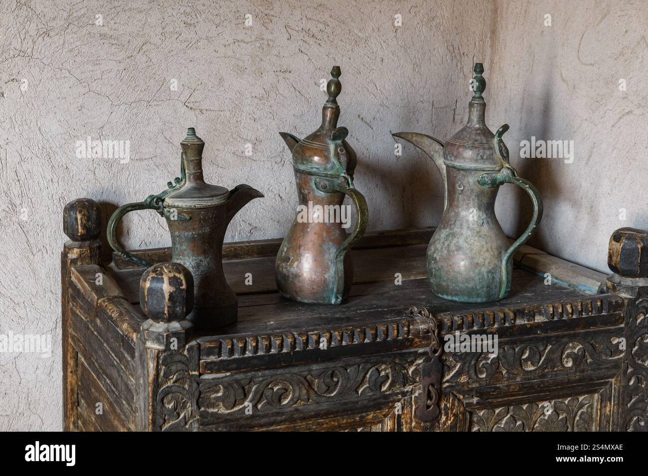 Khasab, Oman - January 1, 2025: Antique brass pitchers displayed on an ...