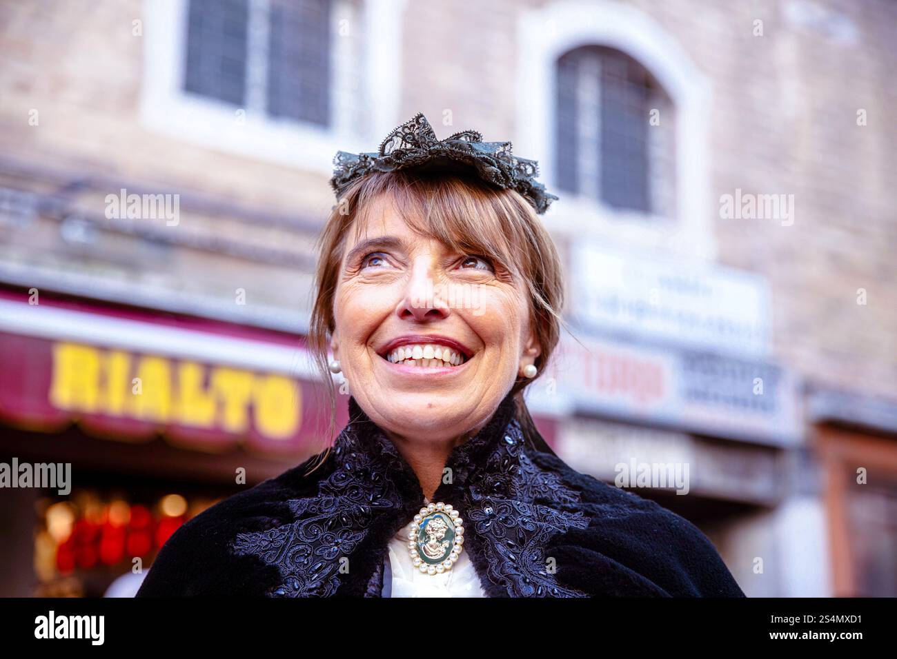 Mature caucasian woman smiling in vintage clothing outdoors Stock Photo ...