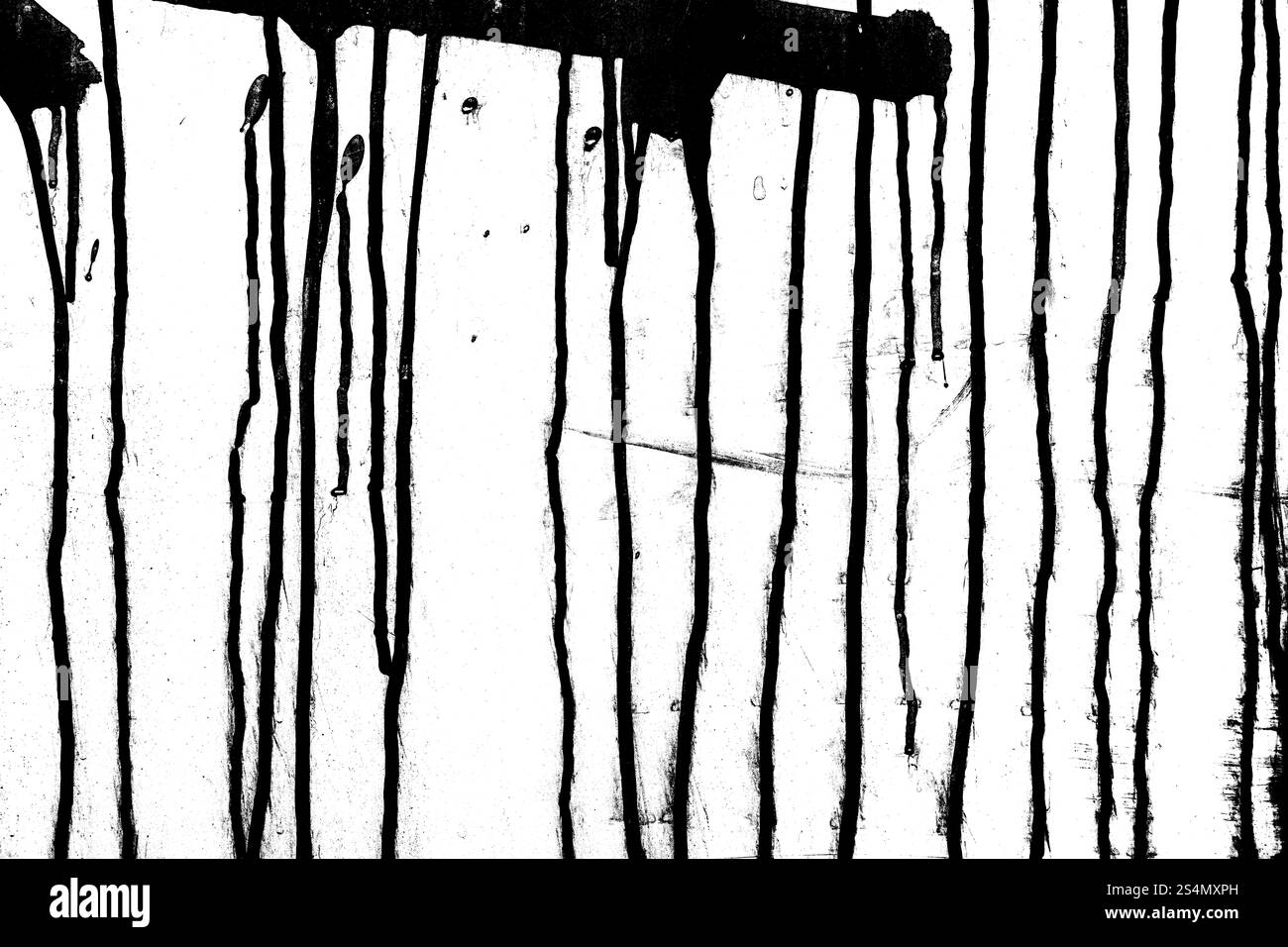 Black paint splatter over white wall surface as background Stock Photo ...
