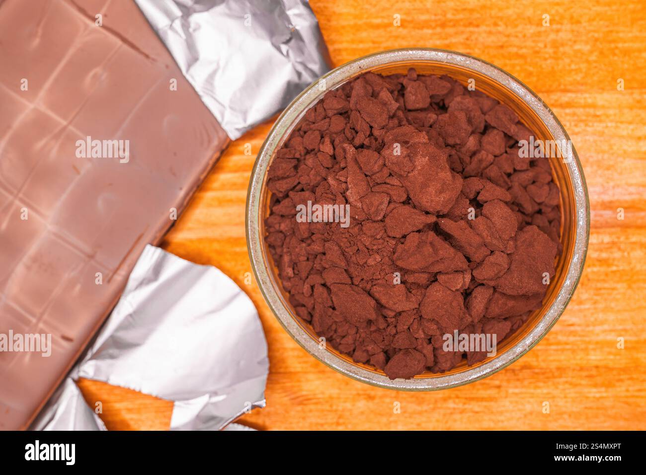Cocoa powder in glass tray with some milk chocolate, top view Stock ...