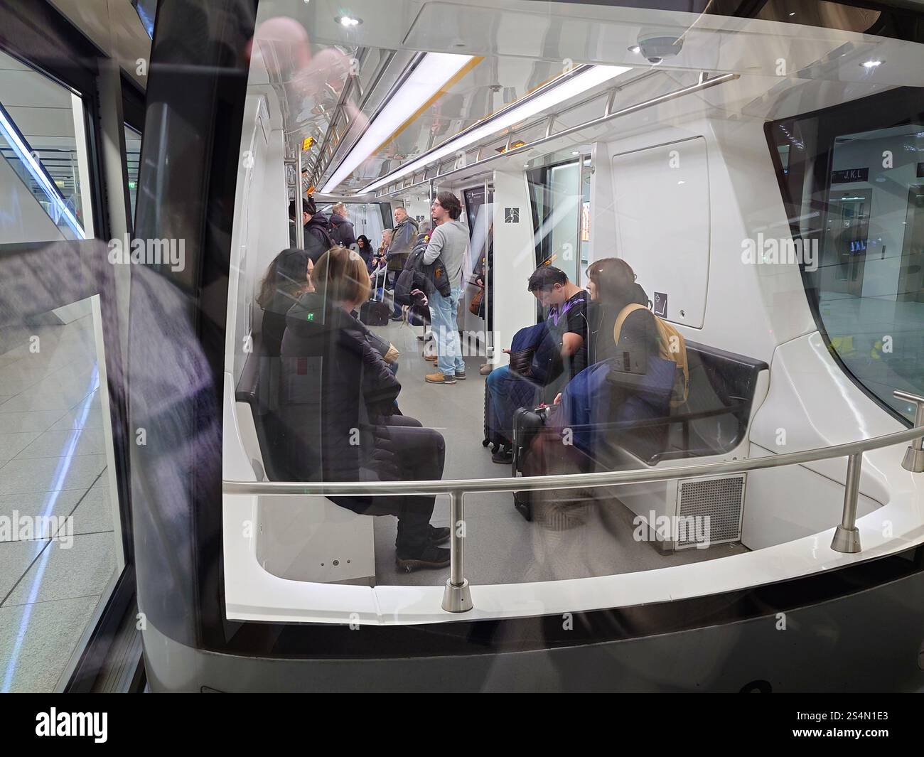 27-12-2024 Munich International Airport, Germany. People using the ...