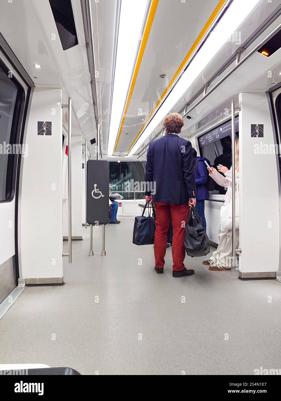 27-12-2024 Munich International Airport, Germany. People using the ...