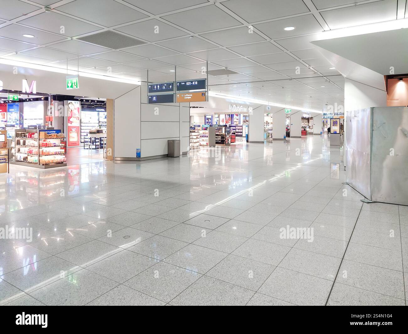 27-12-2024 Munich International Airport, Germany. People walking and ...
