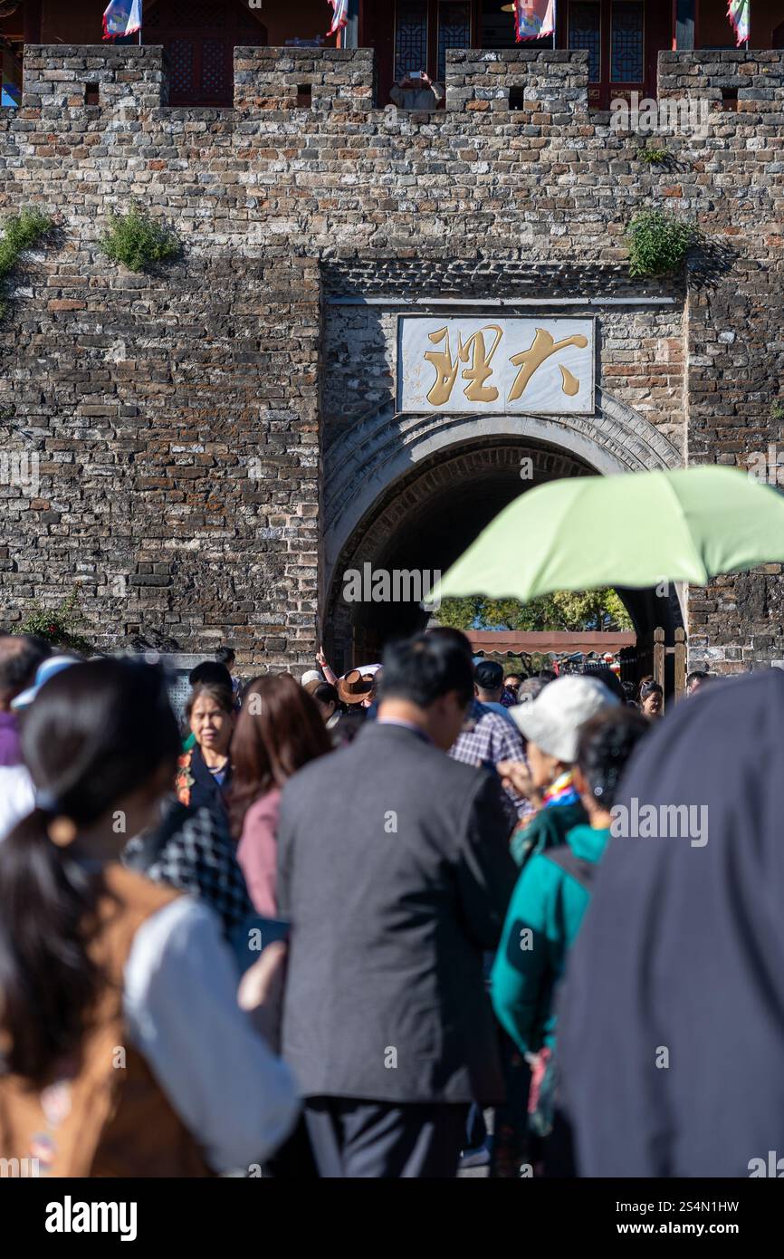 Dali Old Town, China - November 19, 2024 : A crowd of people gathers at ...