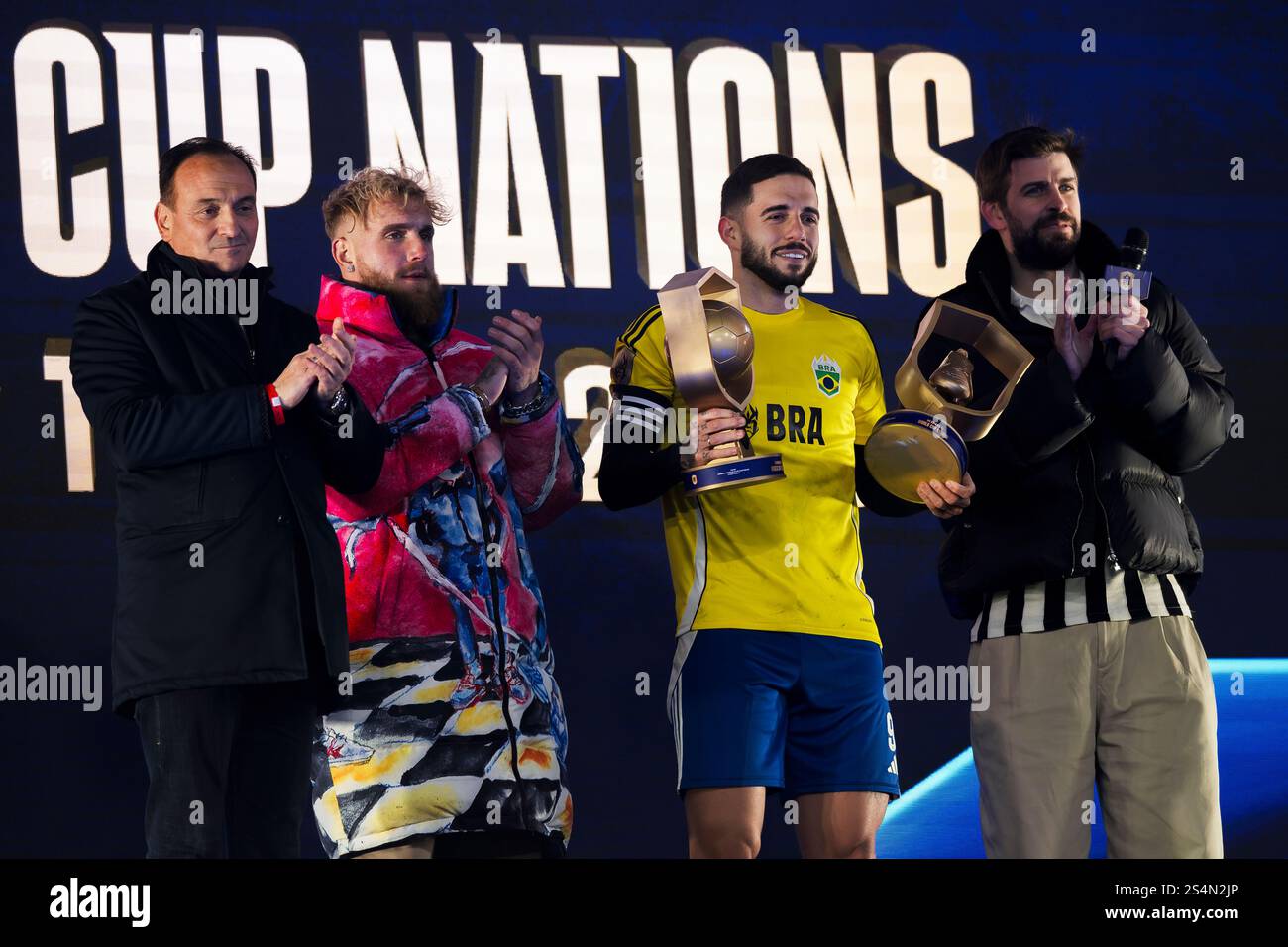 Turin, Italy. 12 January 2025. Kelvin Oliveira (C) of Brazil lifts the ...