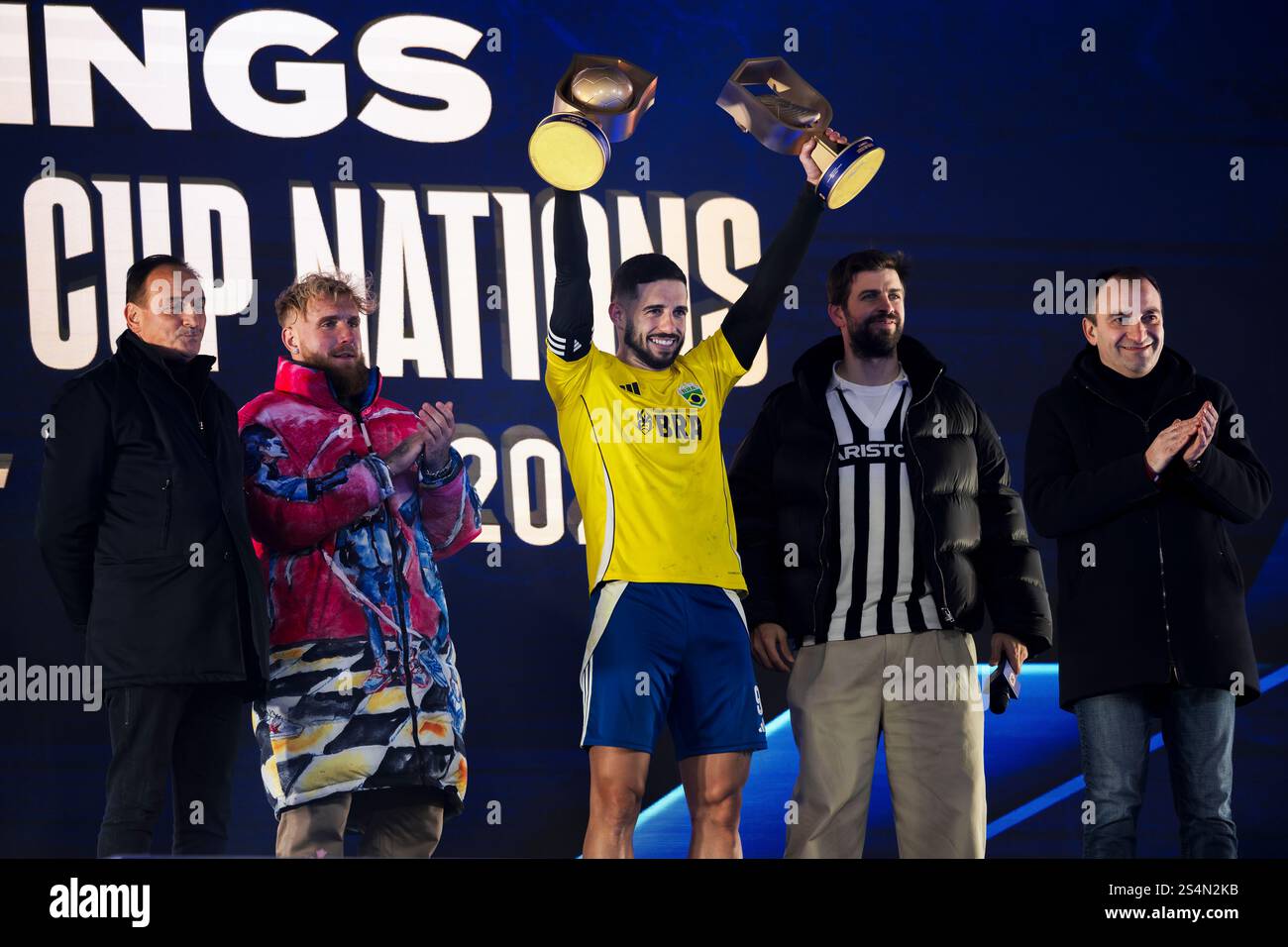 Turin, Italy. 12 January 2025. Kelvin Oliveira (C) of Brazil lifts the ...