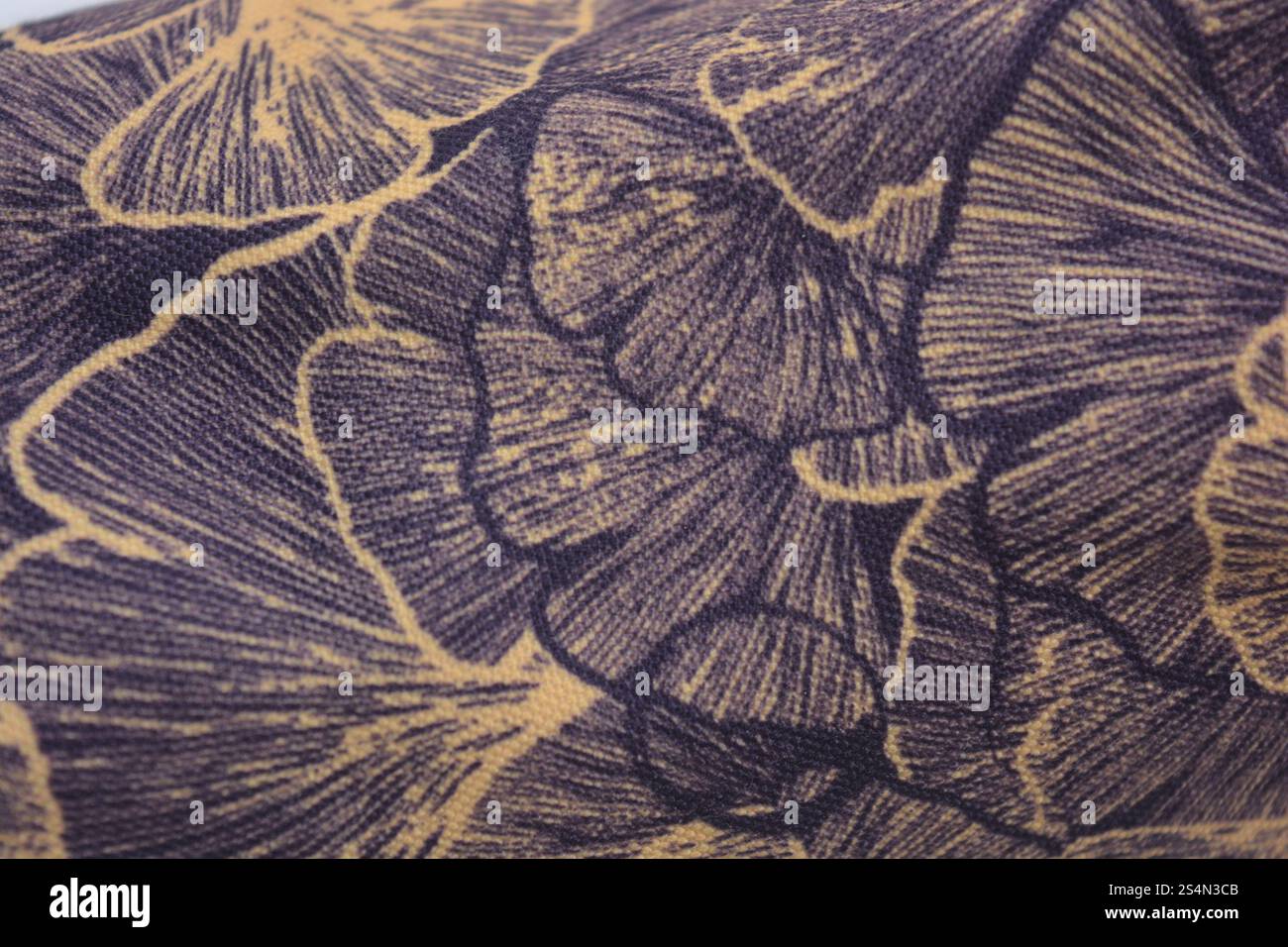 Unusual fabrics, denim with an unusual pattern of orange flowers on a ...