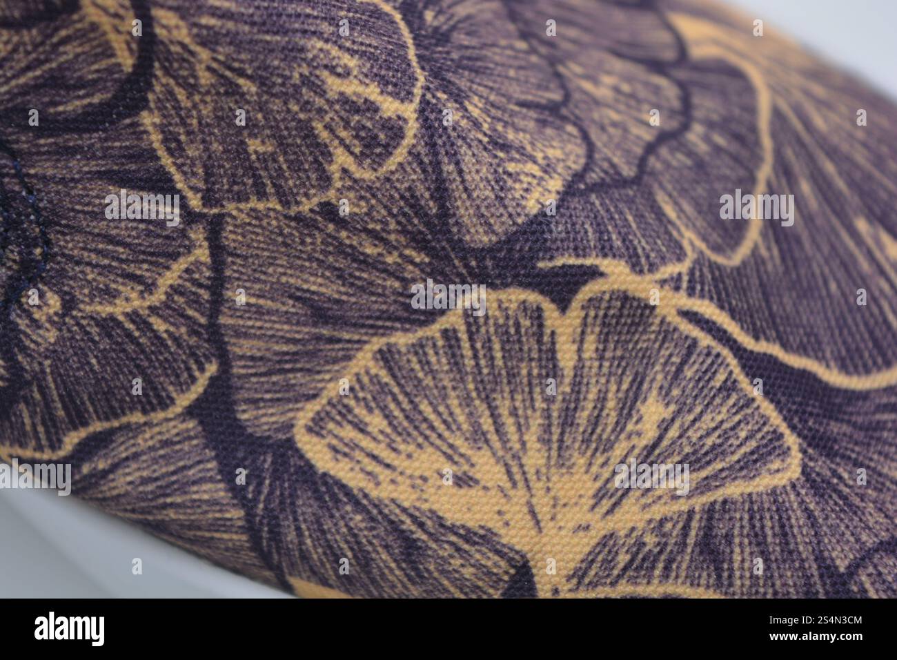 Unusual fabrics, denim with an unusual pattern of orange flowers on a ...