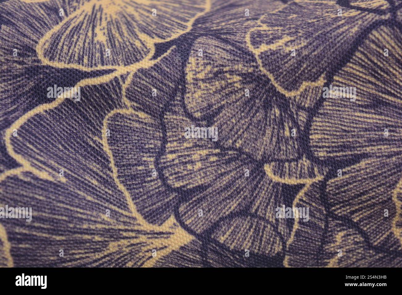 Unusual fabrics, denim with an unusual pattern of orange flowers on a ...