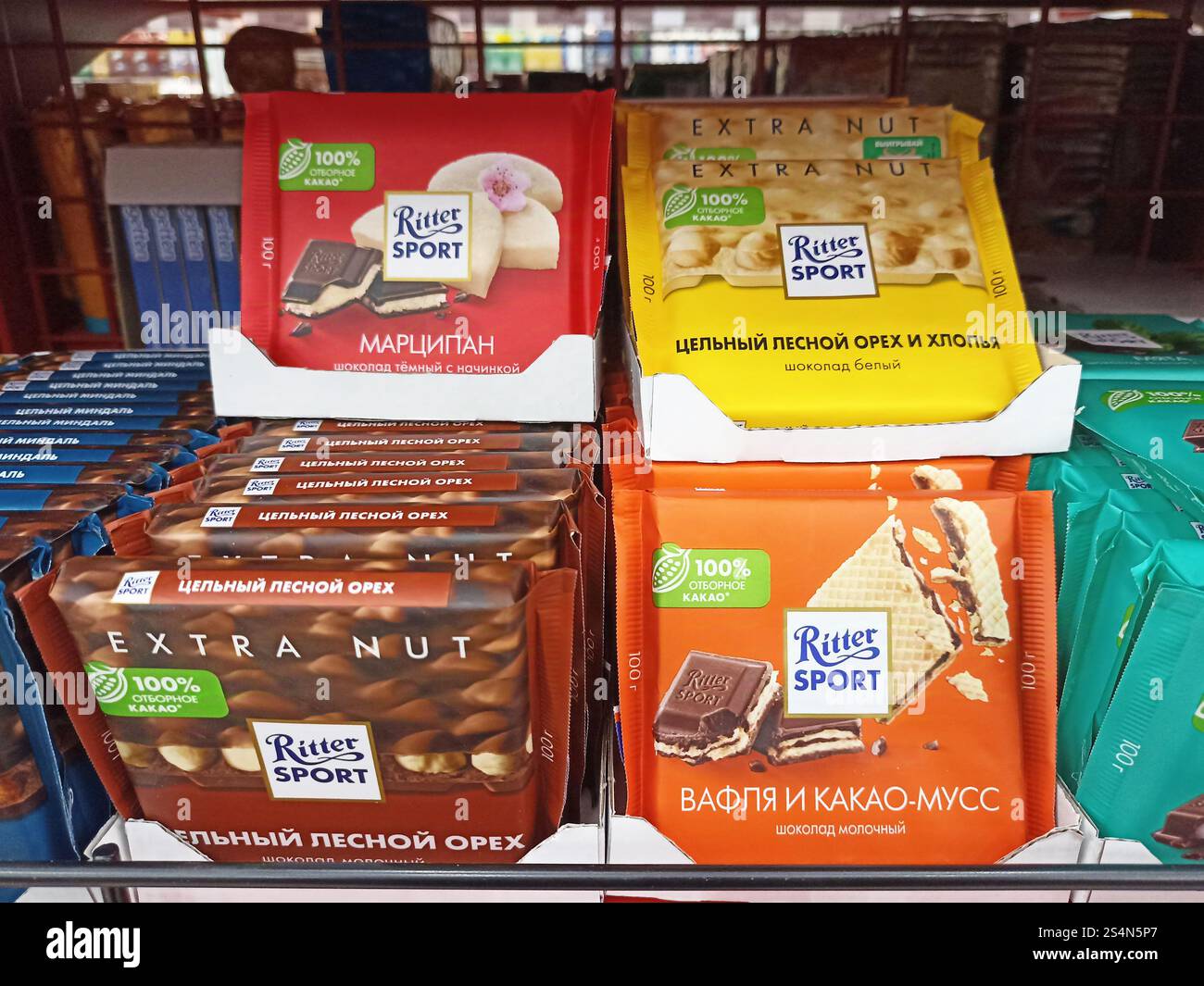 Variety of ritter sport chocolate bars on display shelf Stock Photo - Alamy