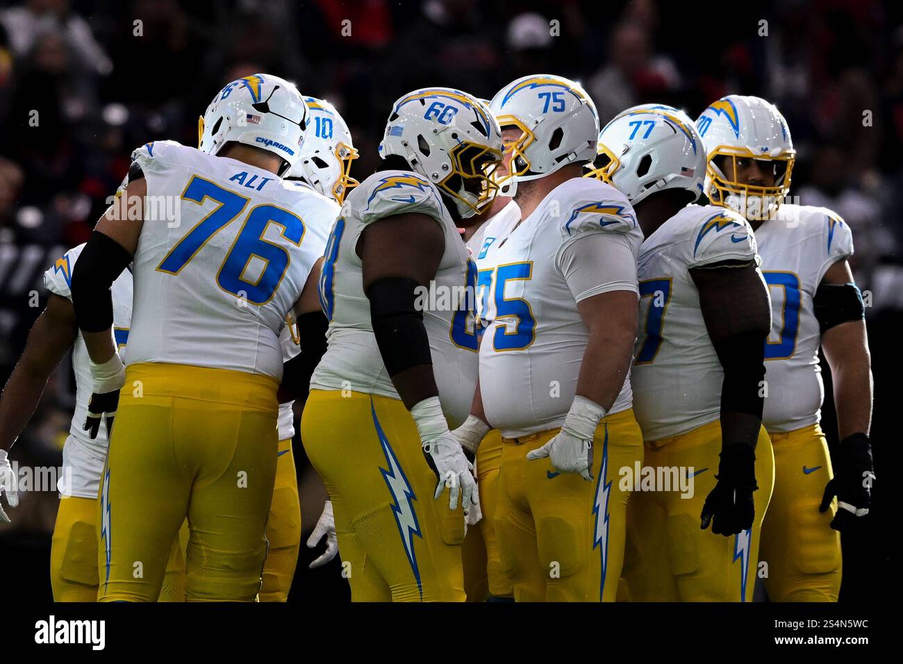 Los Angeles Chargers offense huddle up in the first quarter during an ...