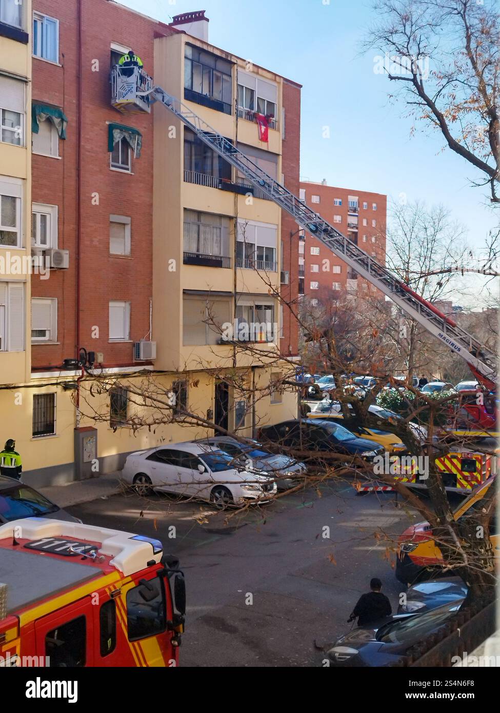 Firefighters. Firefighters entering through a house window. Fire and ...