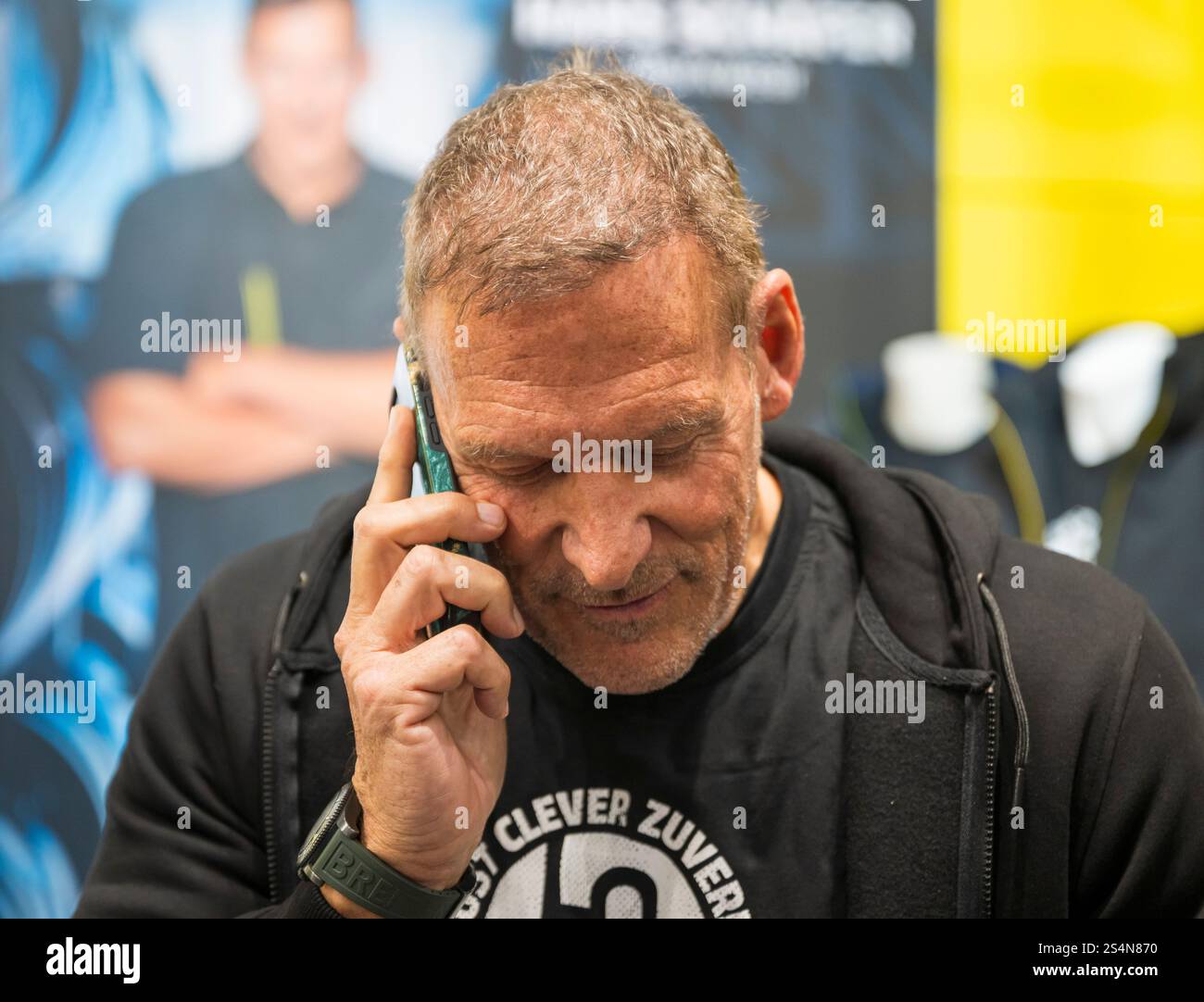 13 January 2025, Bavaria, Munich: Actor Ralf Moeller talks on his cell ...