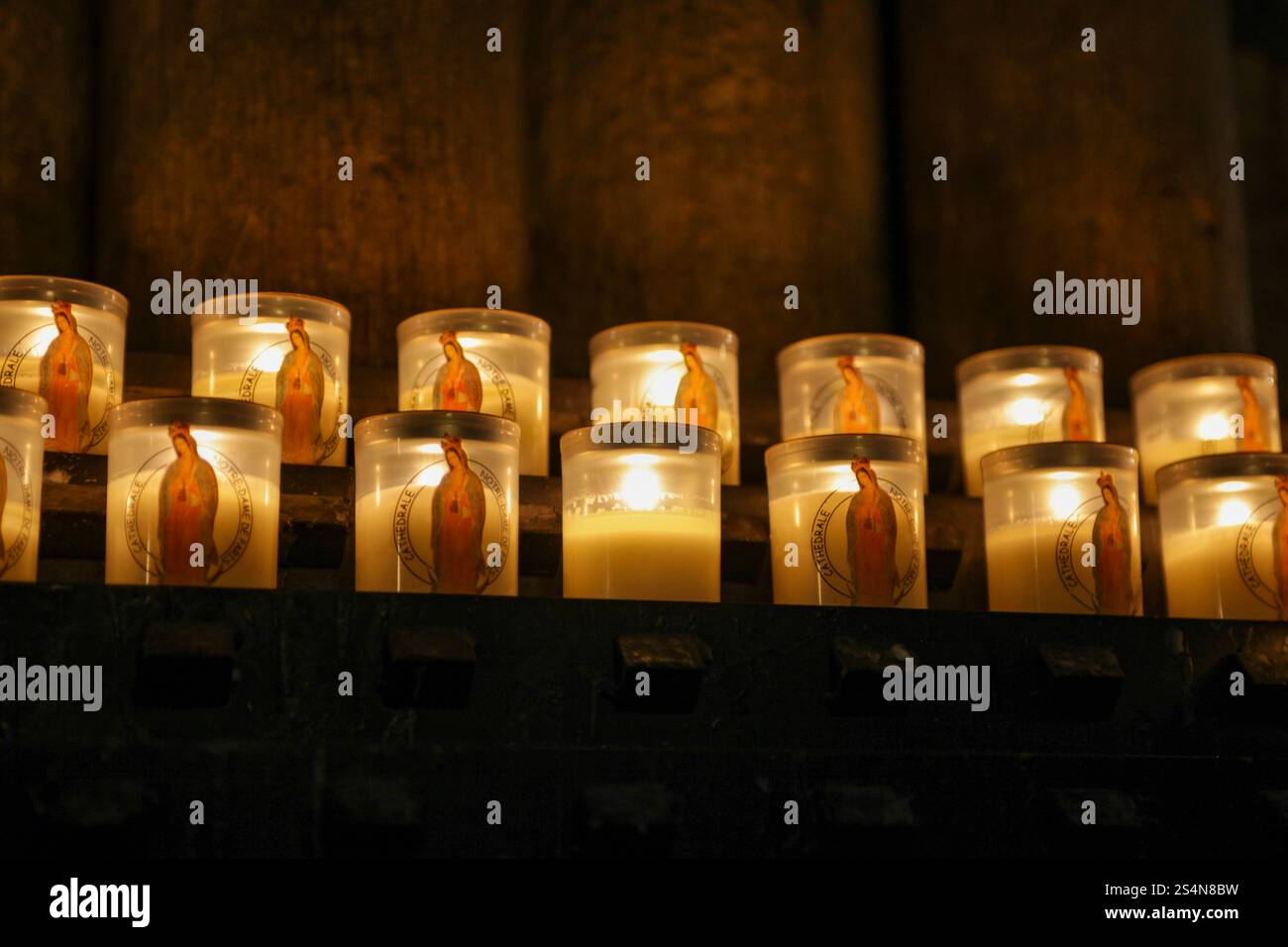 Burning votive candles, Notre Dame Cathedral, Paris, France Stock Photo ...