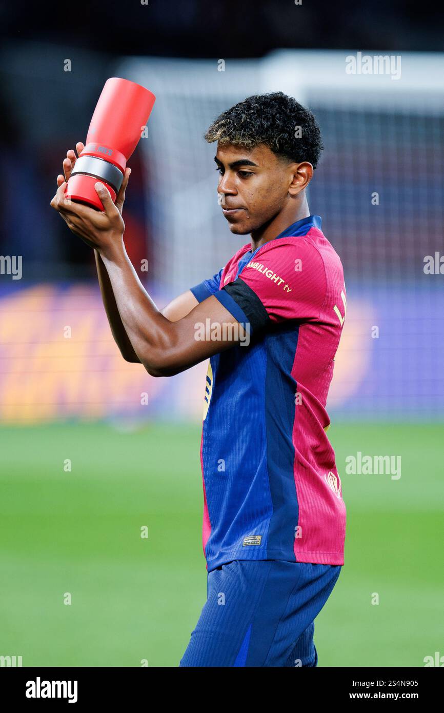 Barcelona, Spain. 20th Oct, 2024. Lamine Yamal holds the MVP of the ...