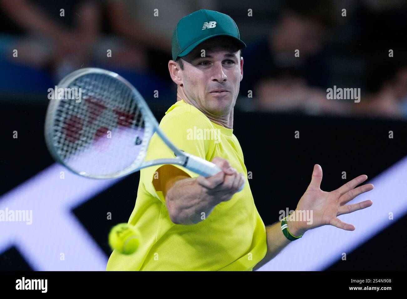 Tommy Paul of the U.S. plays a forehand return to Christopher O'Connell ...