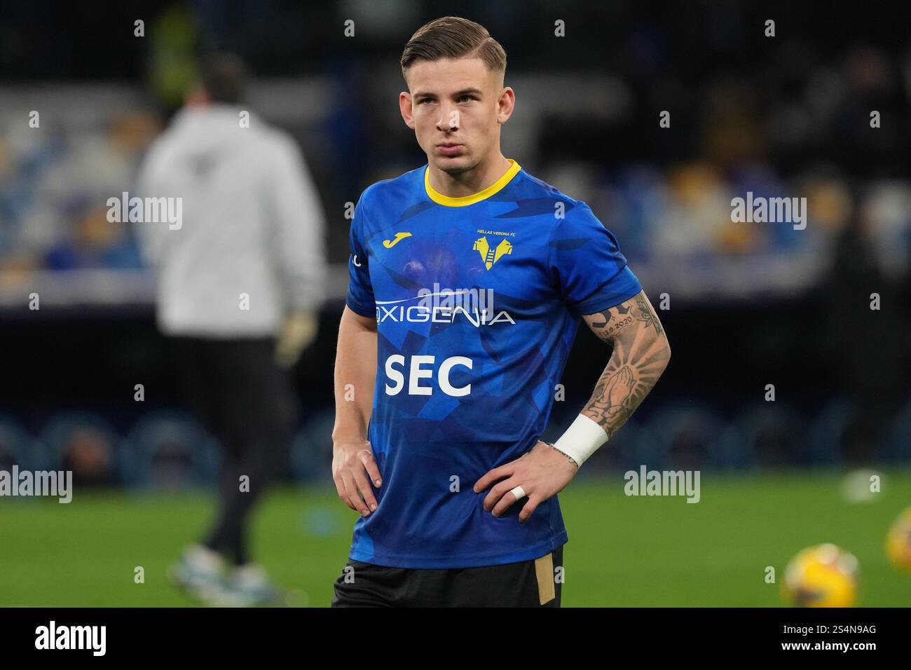 Naples, Italy. 12 Jan, 2025. Tomas Suslov of Hellas Verona warms up ...